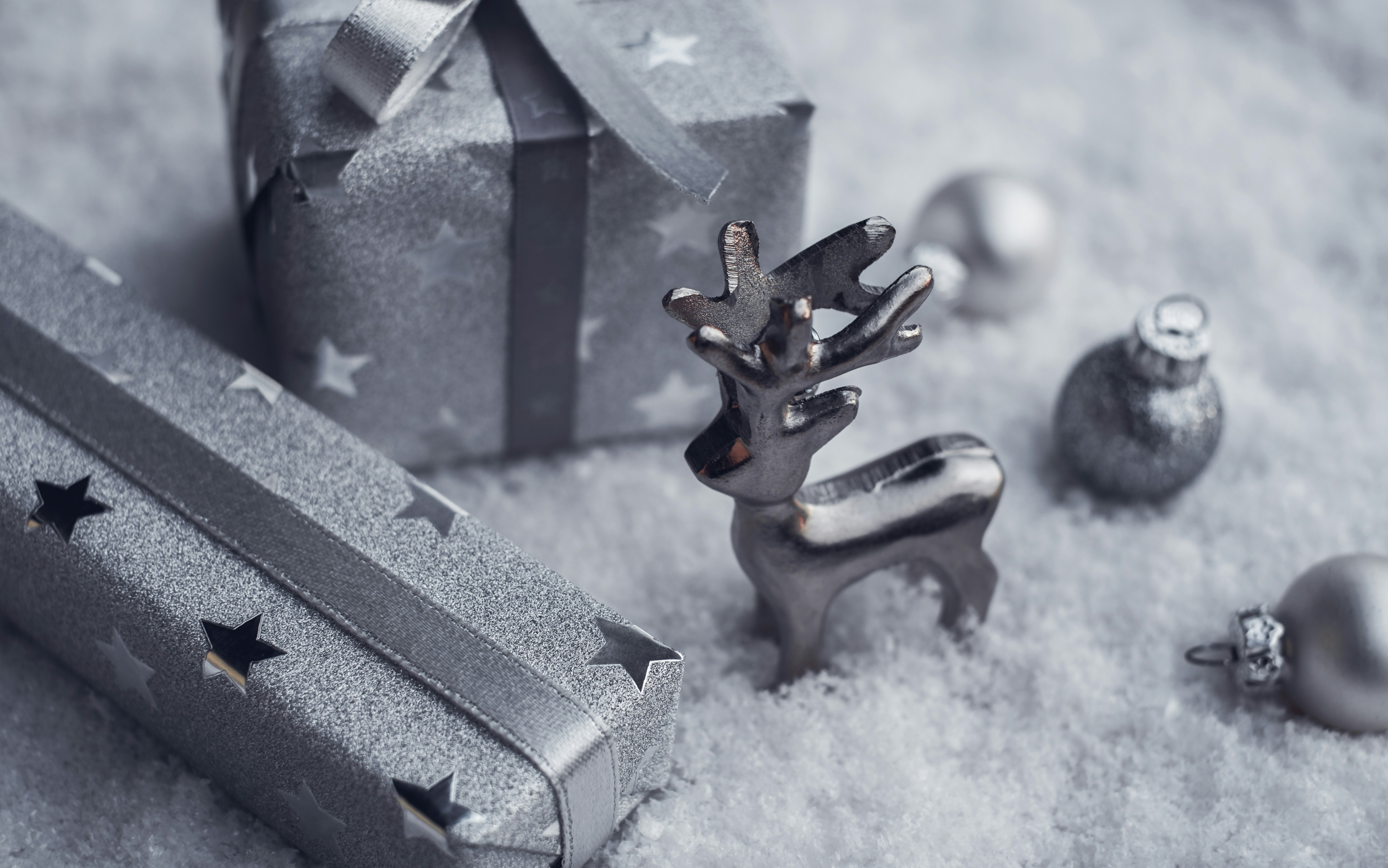 Silent Silver Reindeer Guarding Starry Gifts in Snow