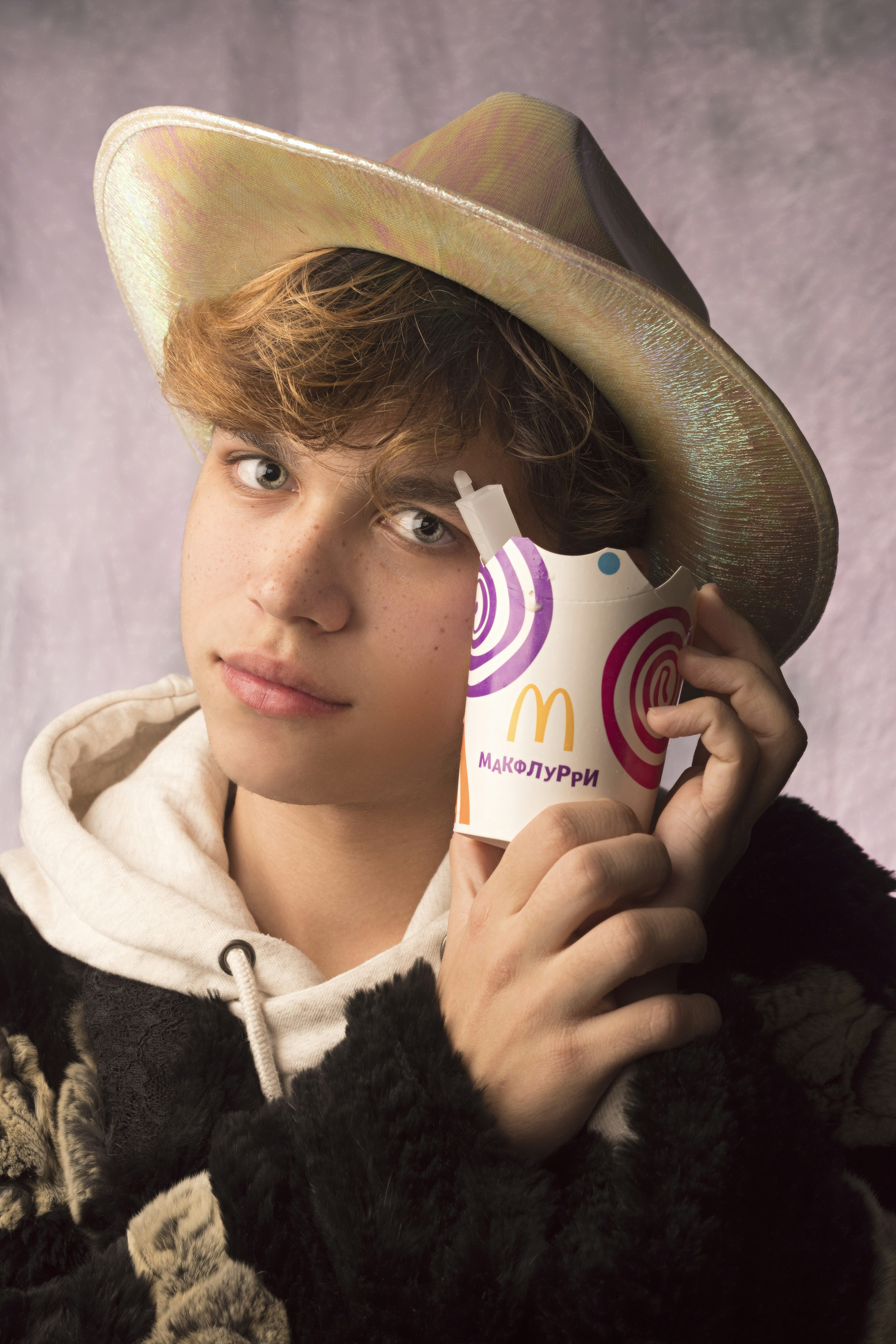 Iridescent Hat, Soft Gaze: A Portrait with a Playful McCup
