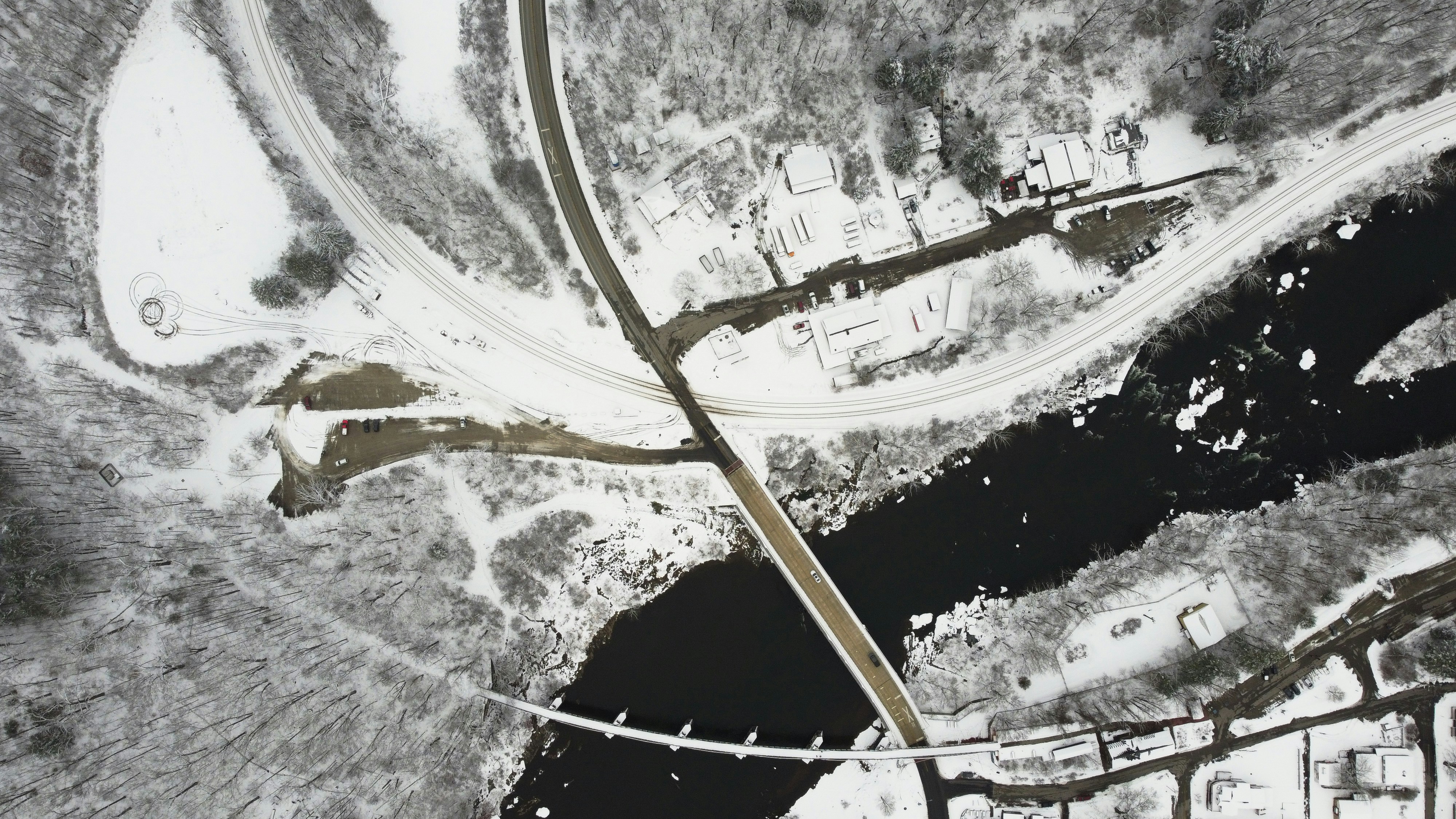 Bridge over Ice and Stream—Aerial Curves in Winter Light