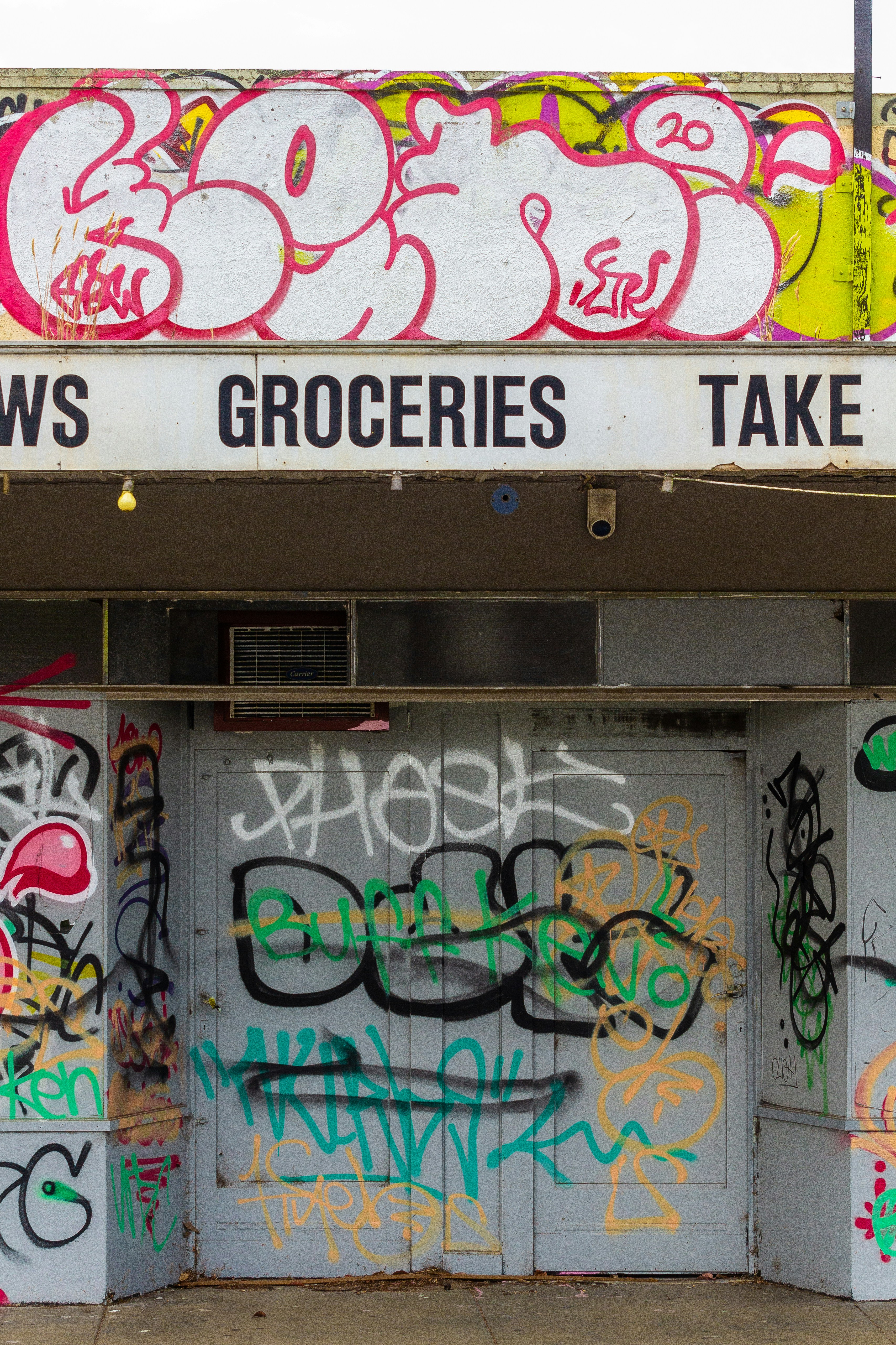 Painted Silence: Graffiti Over a Closed Market Front