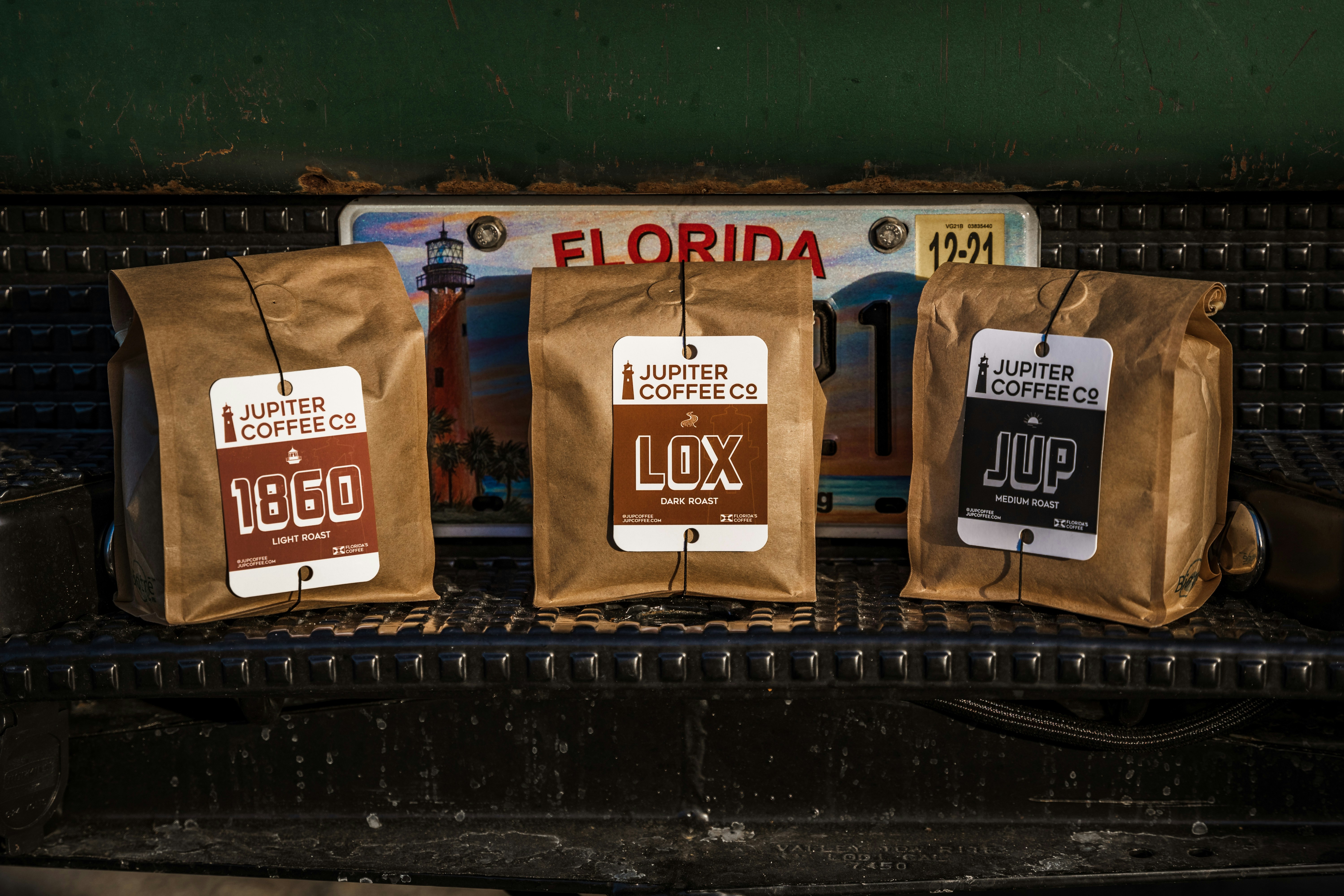 Three Bags of Artisan Coffee Await the Grinder