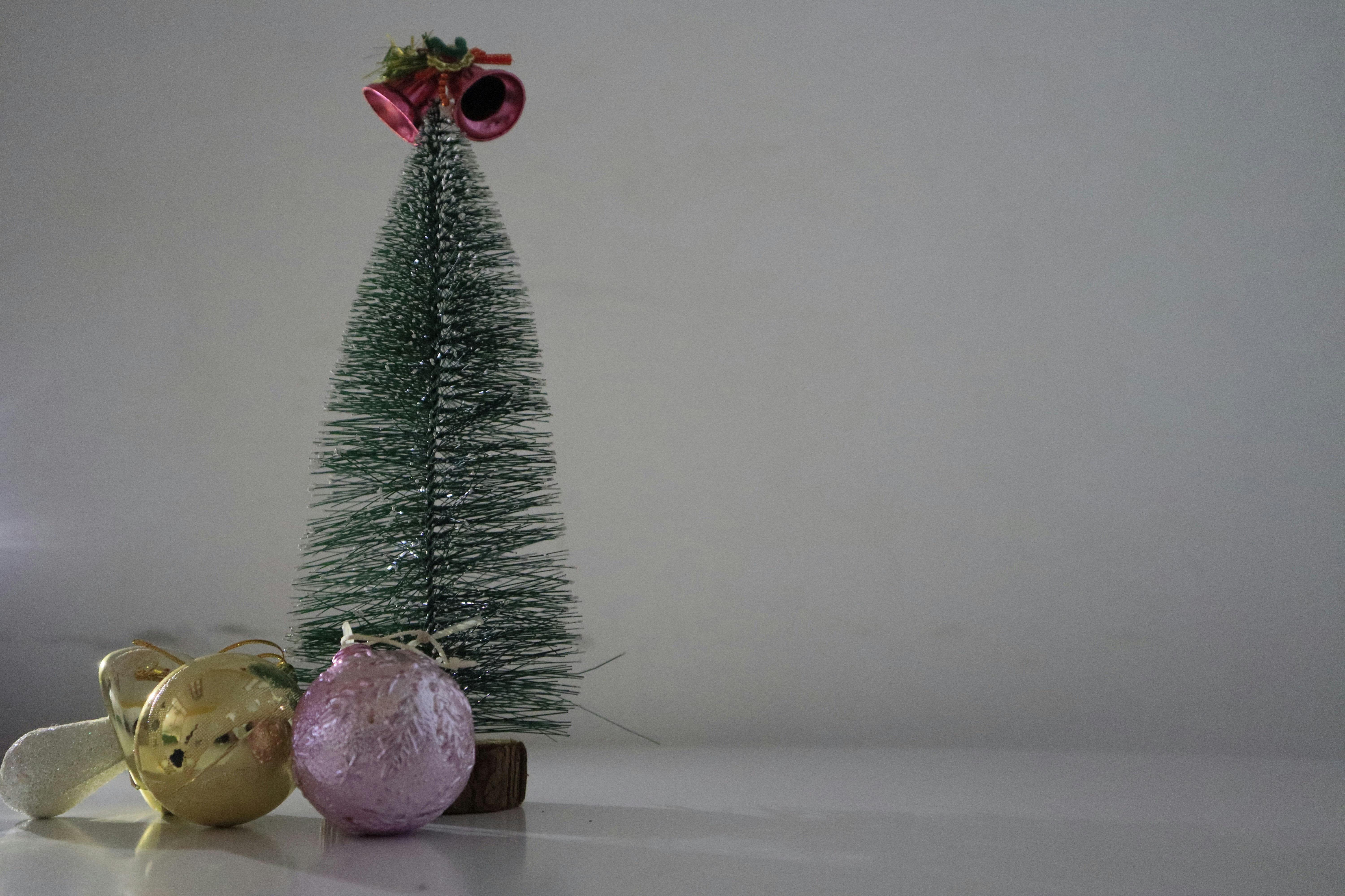 Miniature Christmas Stillness: A Tiny Tree and Ornaments