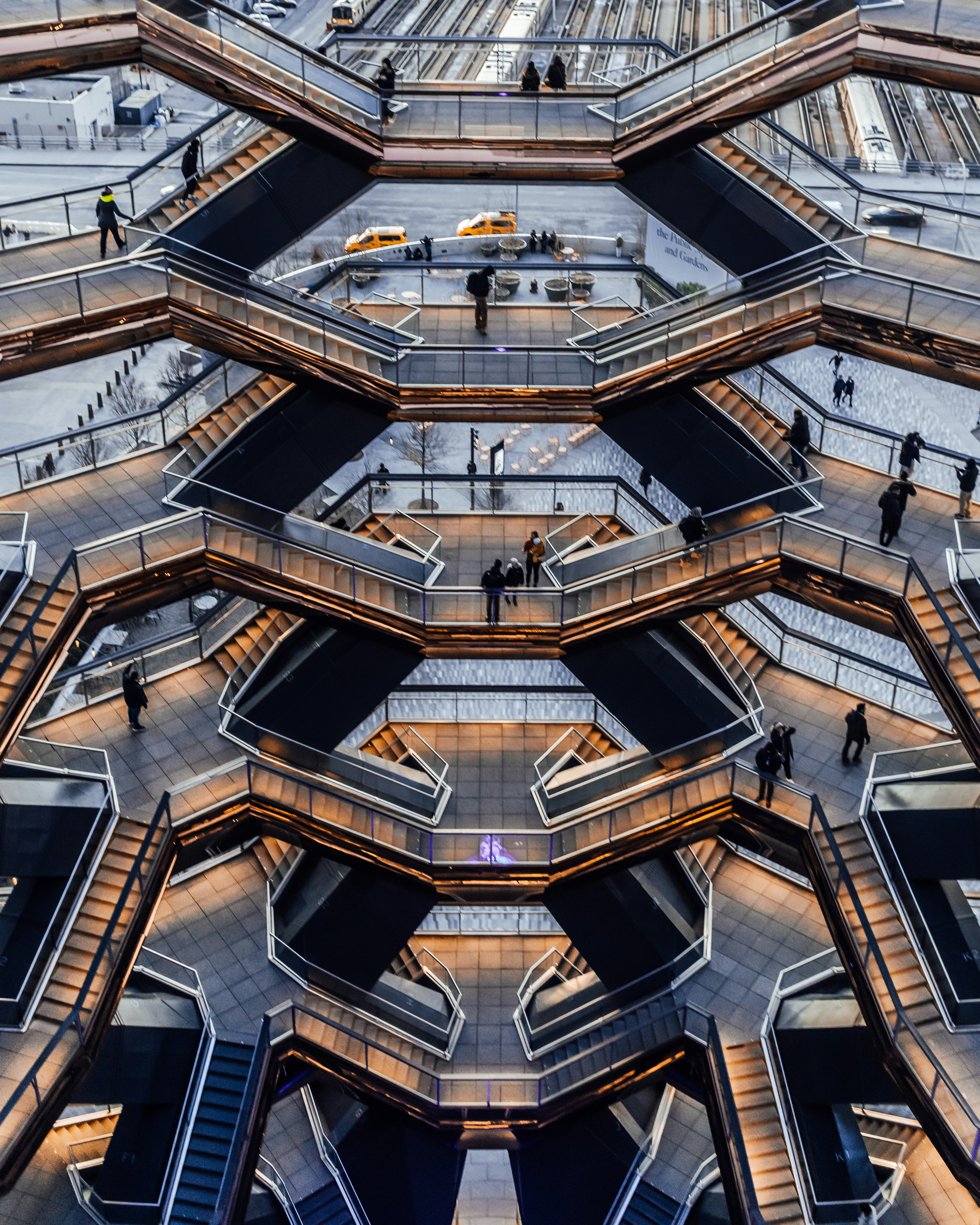 Symmetric Staircase Mesh: Aerial Crossroads in Steel and Light