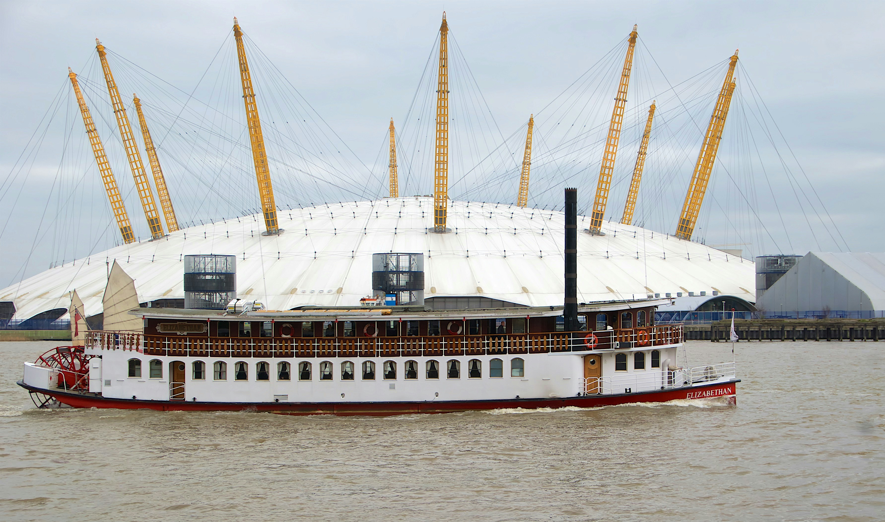 Thames Paddle Steamer by the O2 Dome's Golden Masts