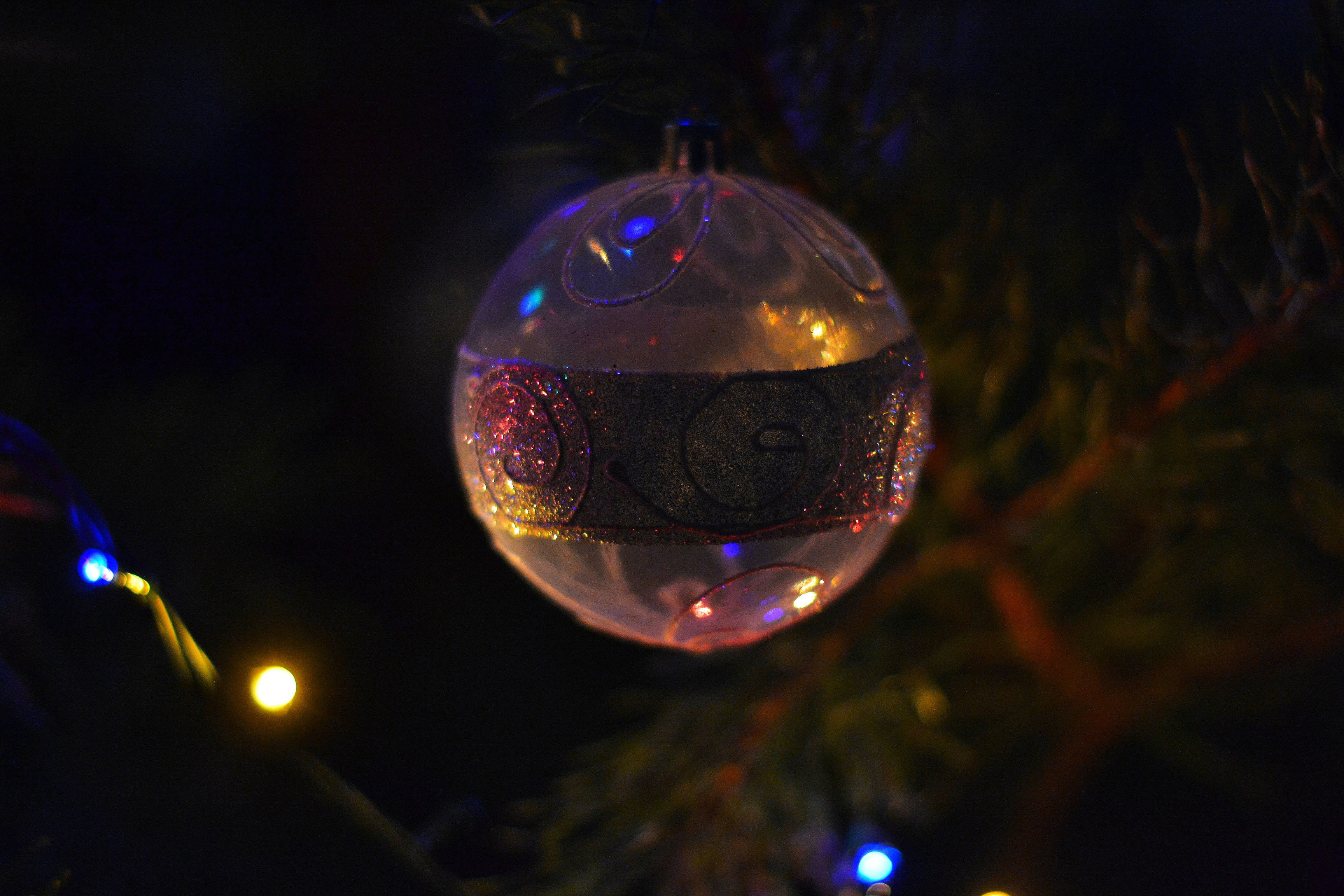 Glowing Ornament: a Glittering Sphere Adrift in Night