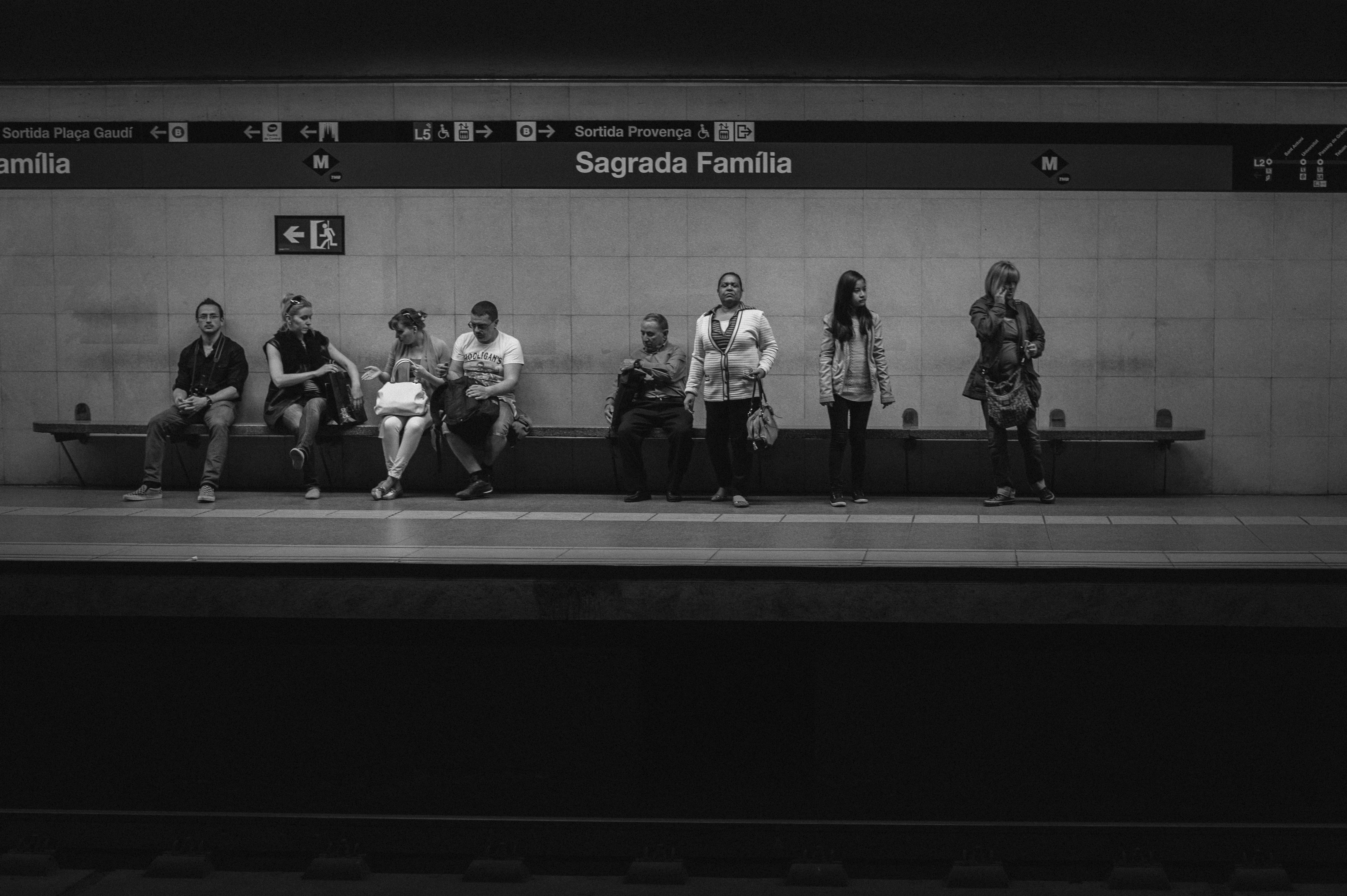 Quiet Convergence on a Barcelona Platform beneath Sagrada Família