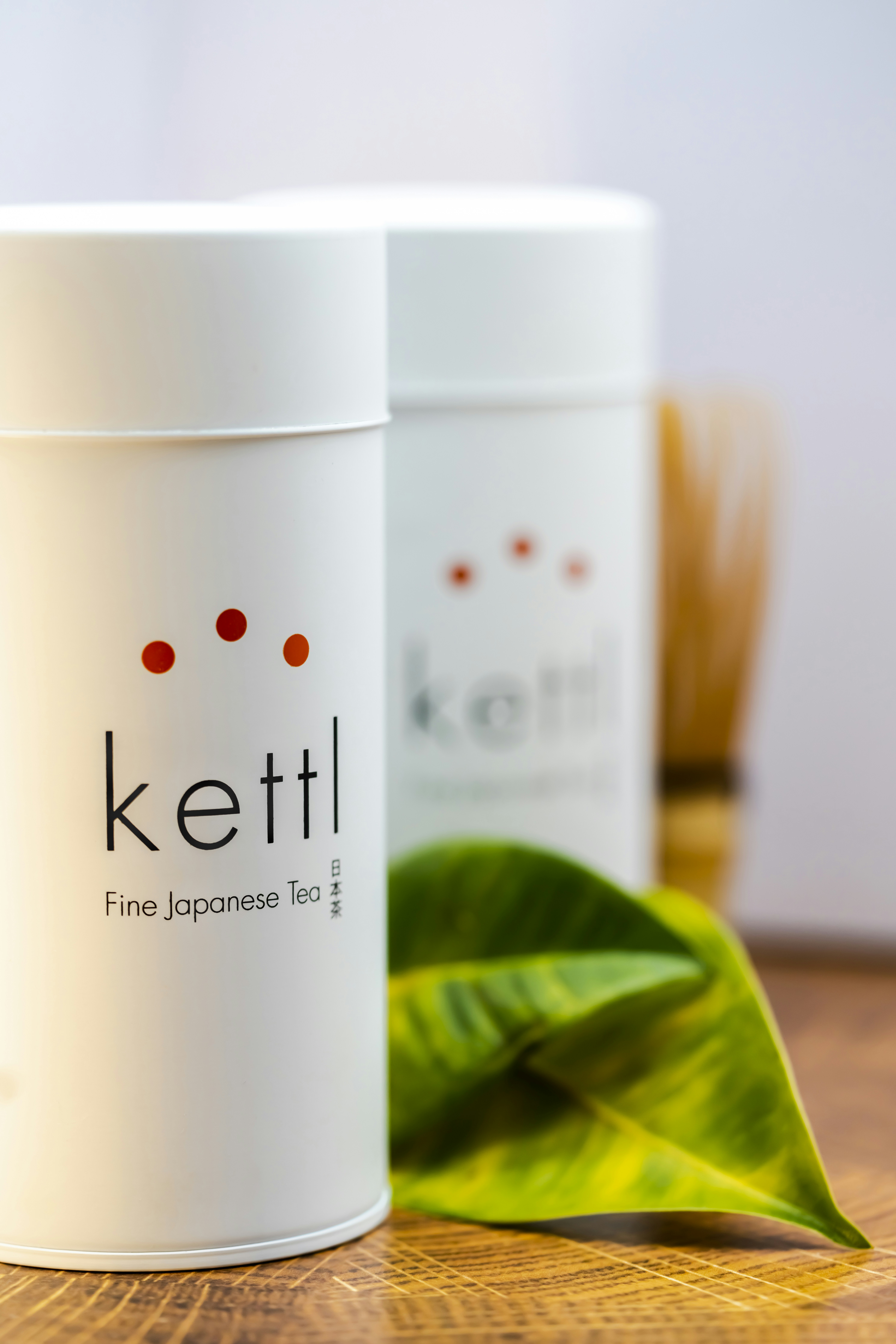 Kettl Fine Japanese Tea Tin: Quiet Portrait on a Wooden Surface