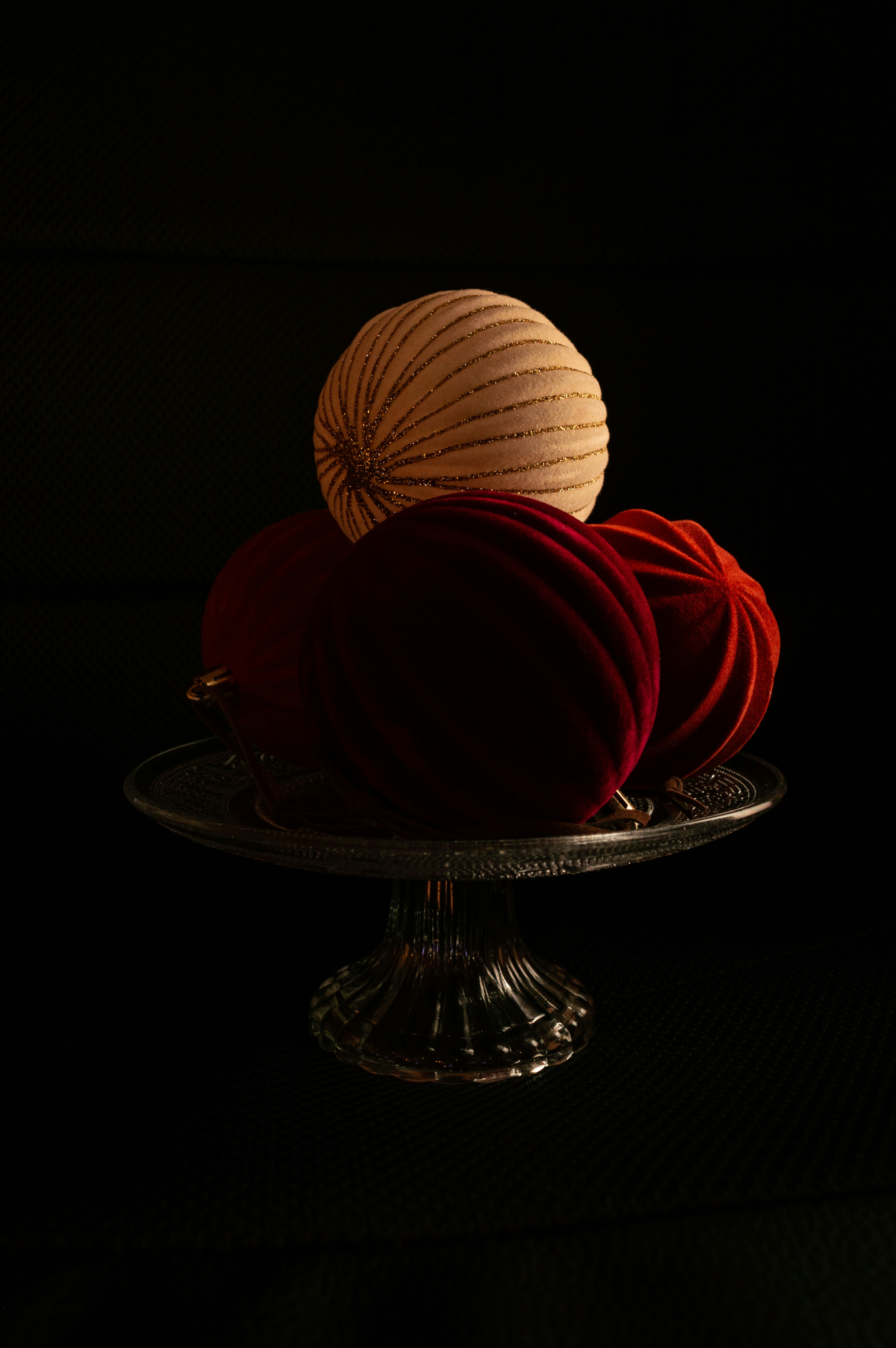 Velvet Orbs on a Glass Stand in a Moonlit Still Life
