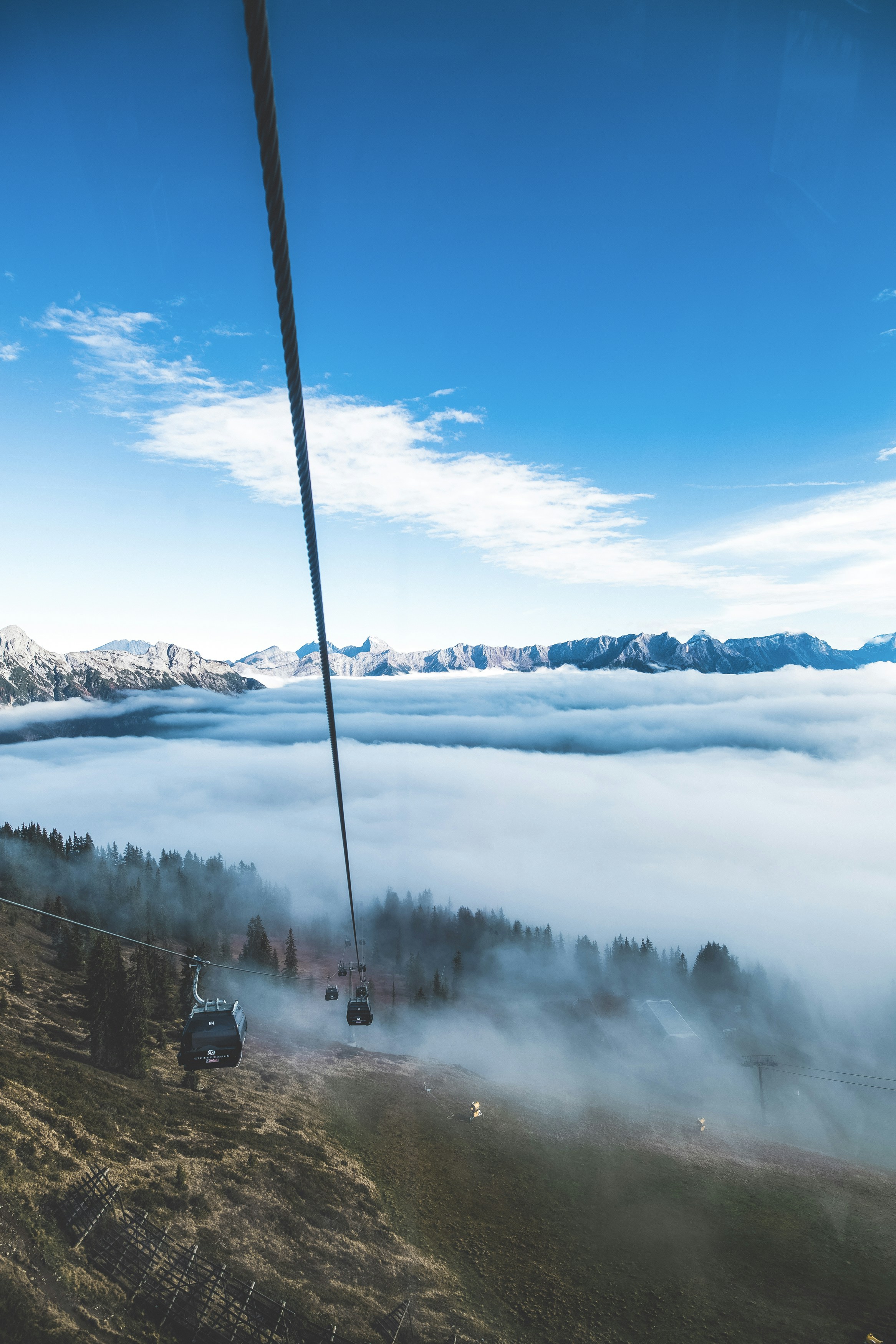 Gondola Trail Through Alpine Mist