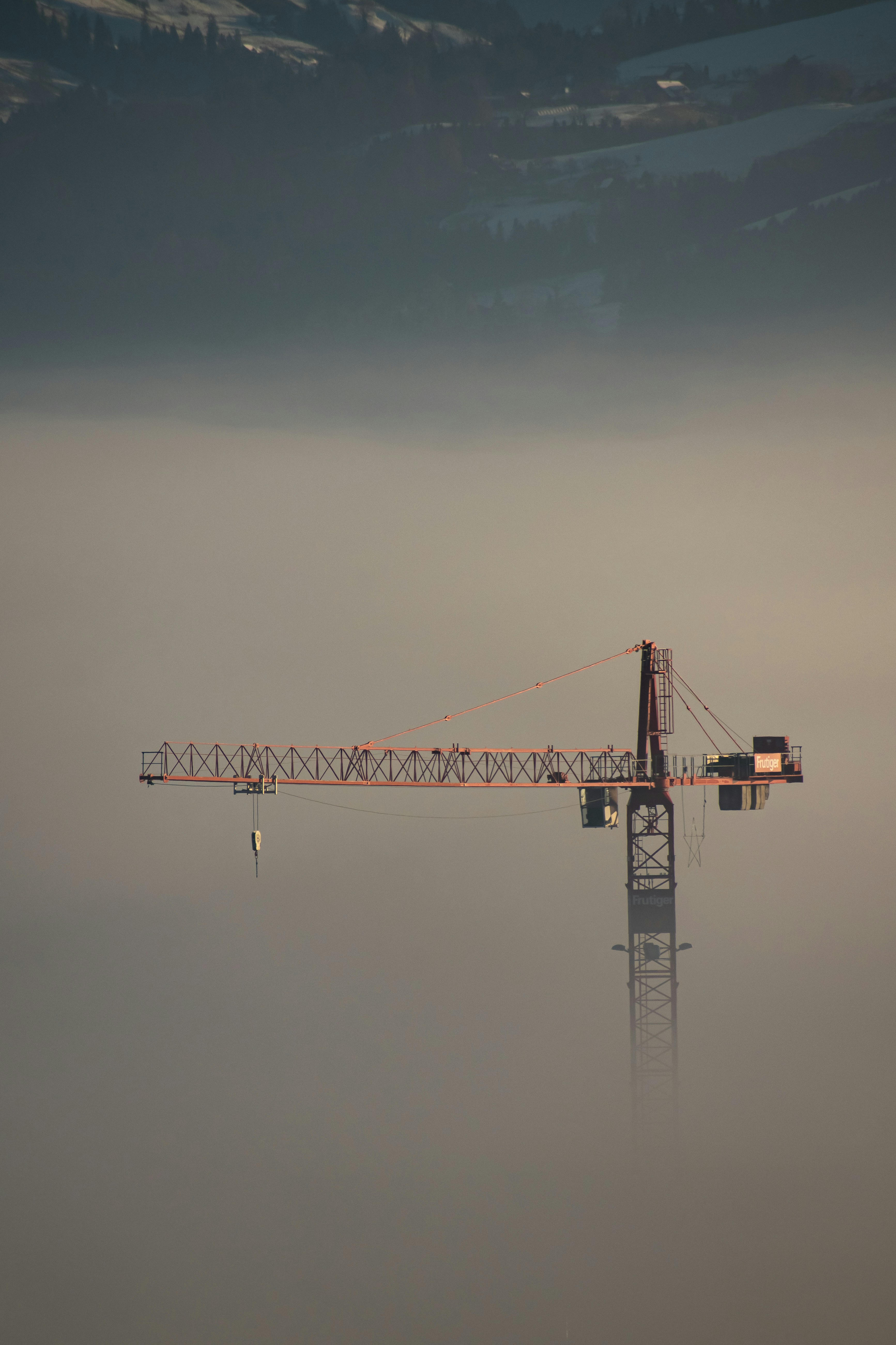 Orange crane under blue sky photo – Free Mythical Image on Unsplash