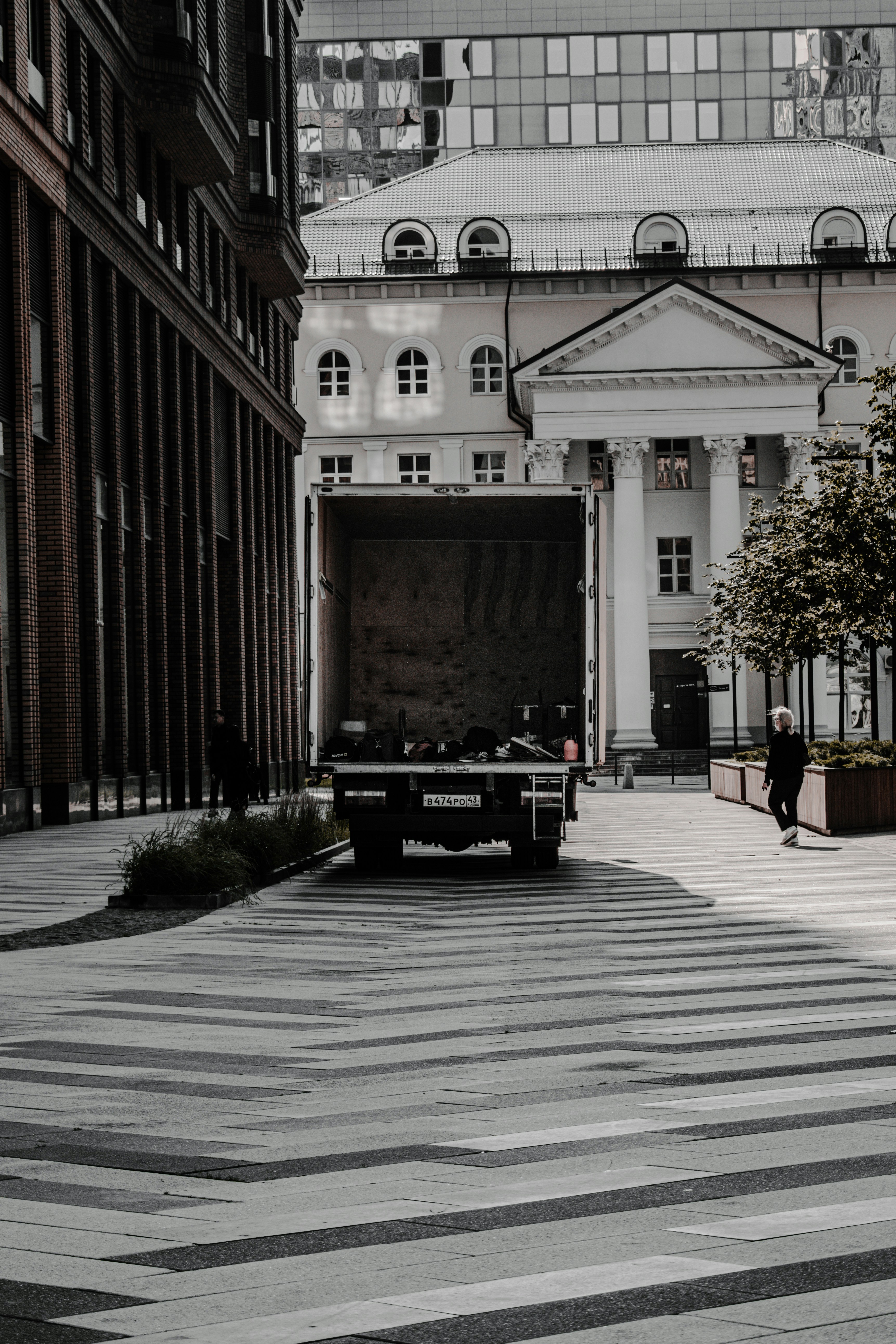 Truck at the Plaza: Geometry and Shadows in a City Courtyard