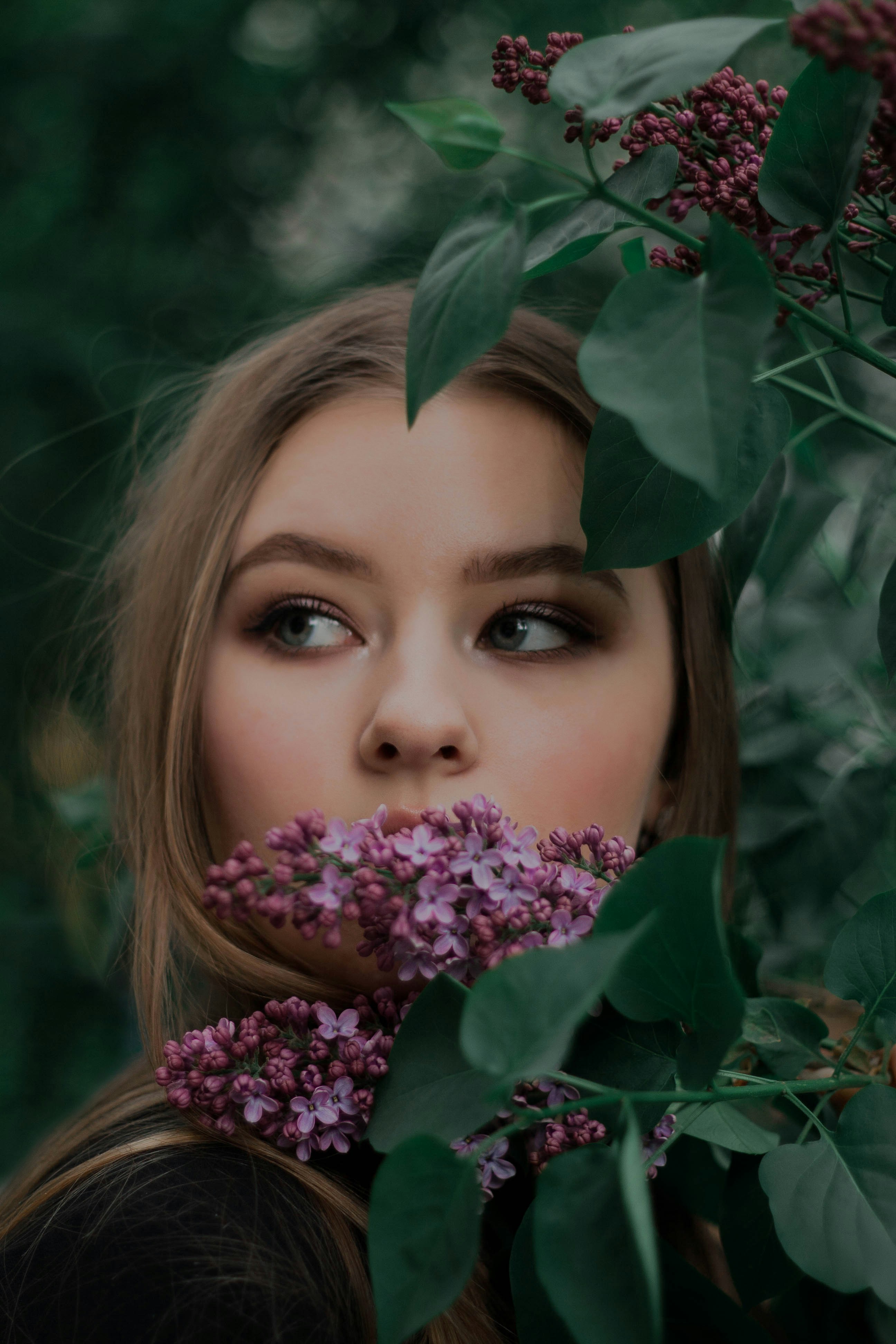Lilac in Focus: Veiled Gaze Through Floral Fragrance