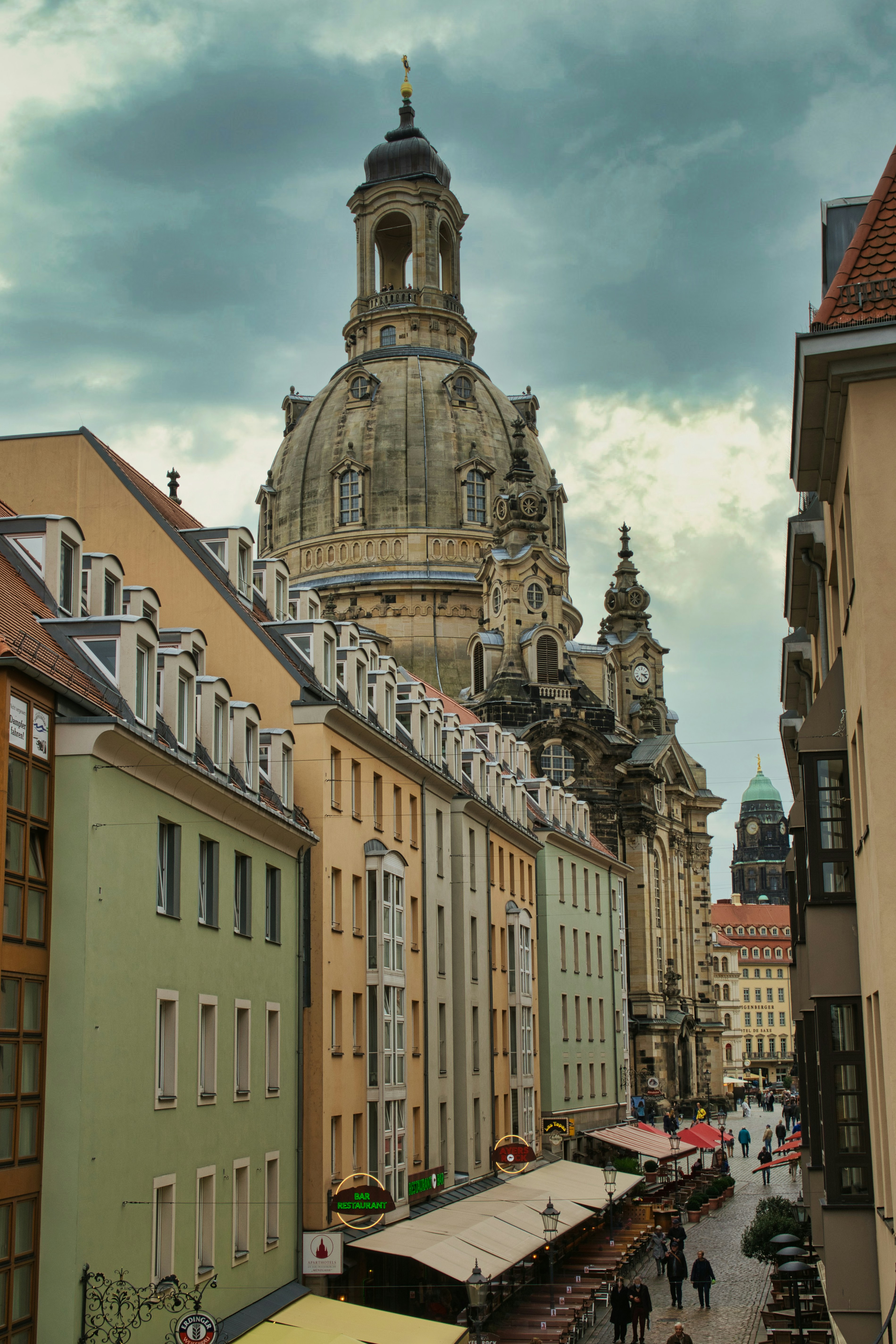Pastel Calle Under a Grand Baroque Dome