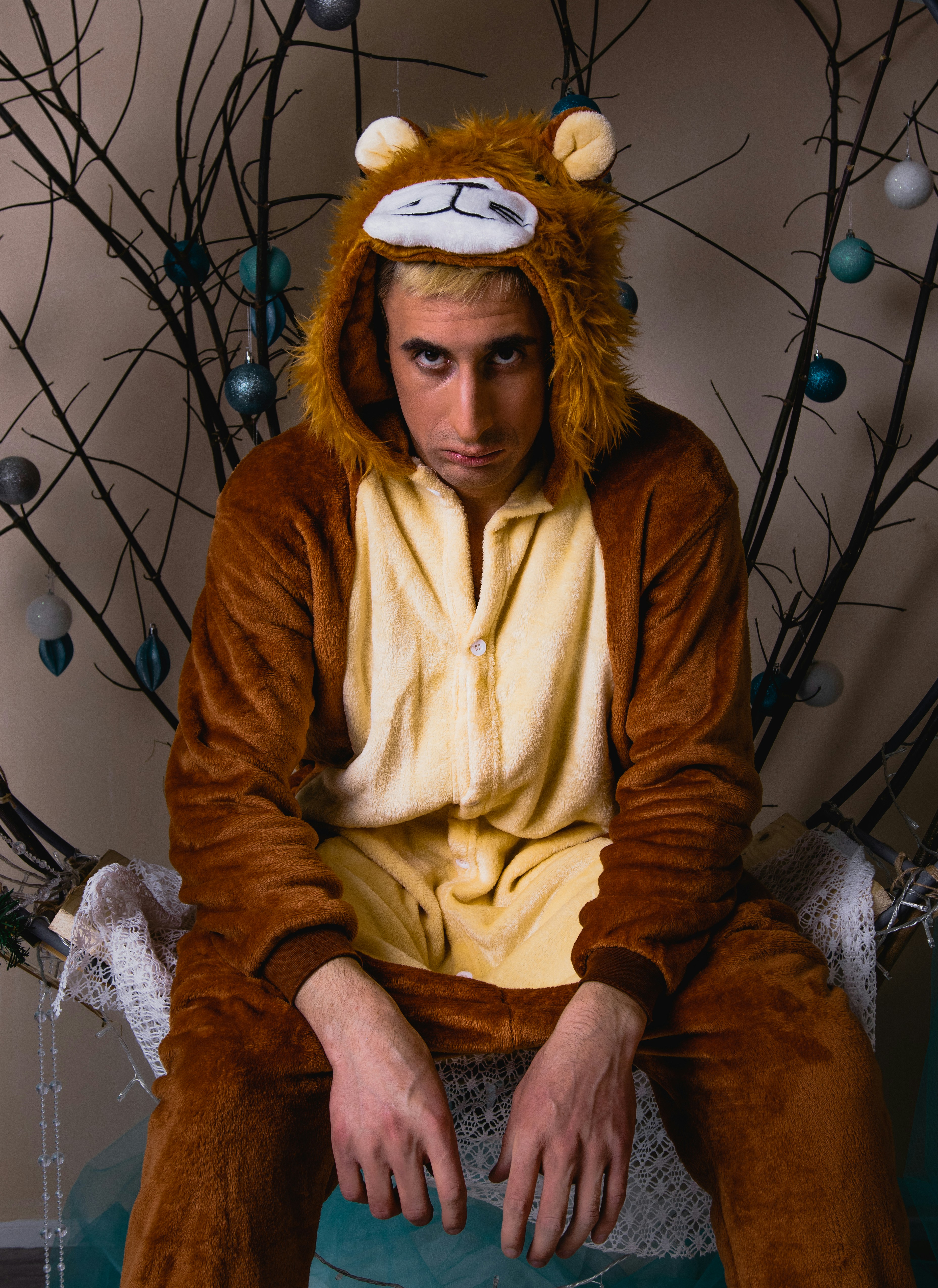 Monkish Glee: A Lion Suit Gazes from a Cozy Corner