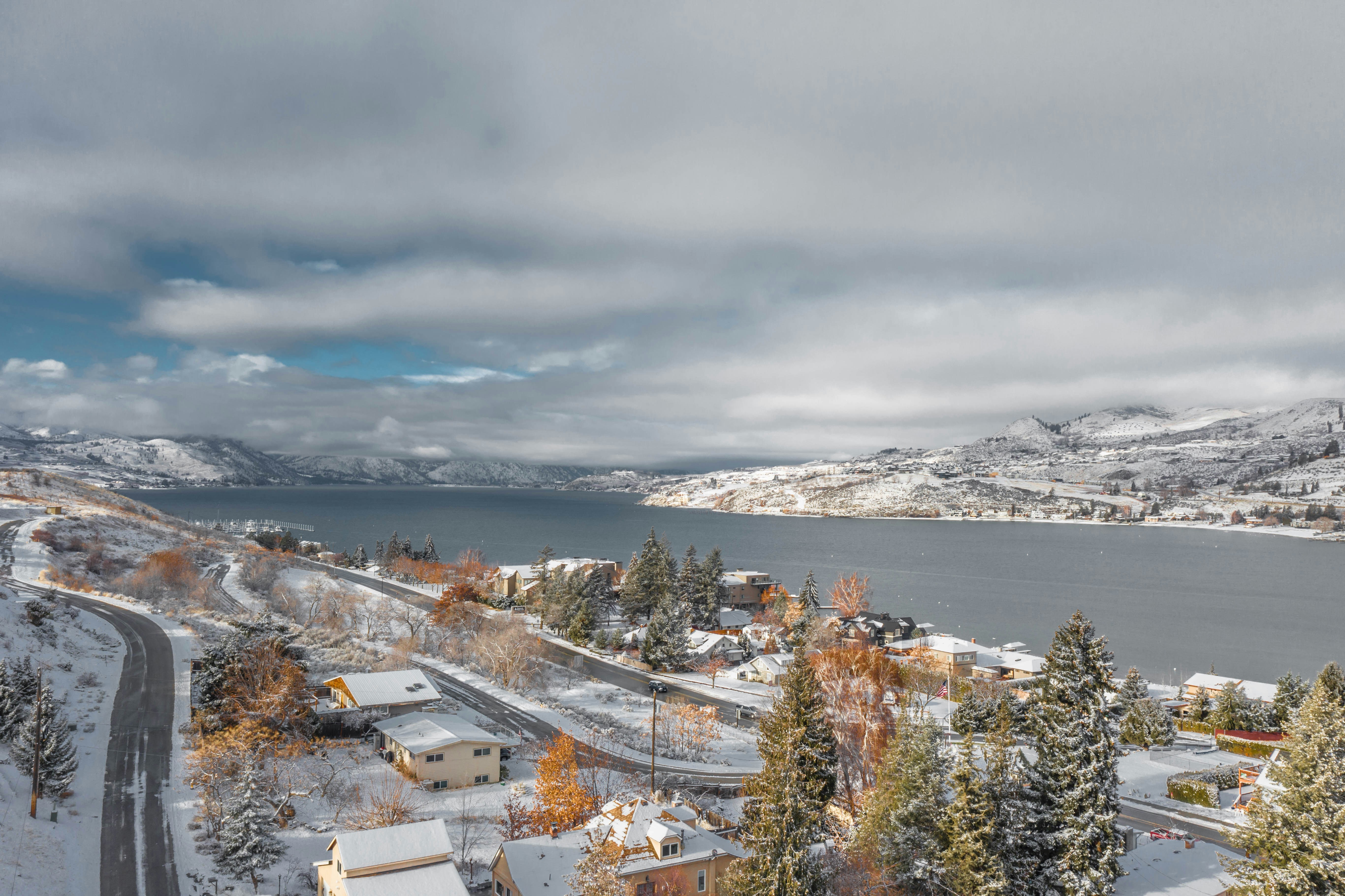 Snowbound Lakeside: A Quiet Village Drinks In Winter Light