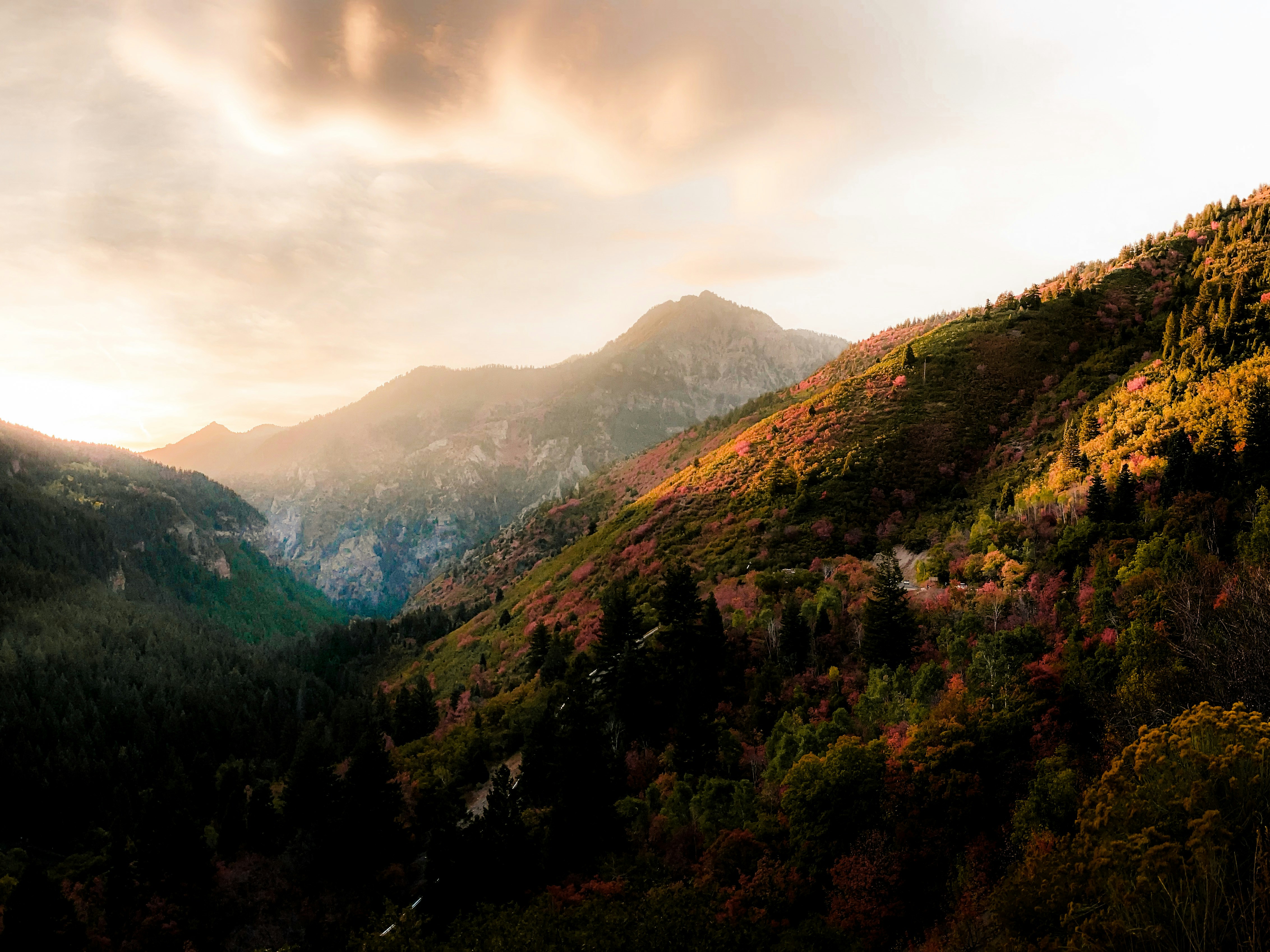 Green and brown mountains under cloudy sky during daytime photo – Free ...