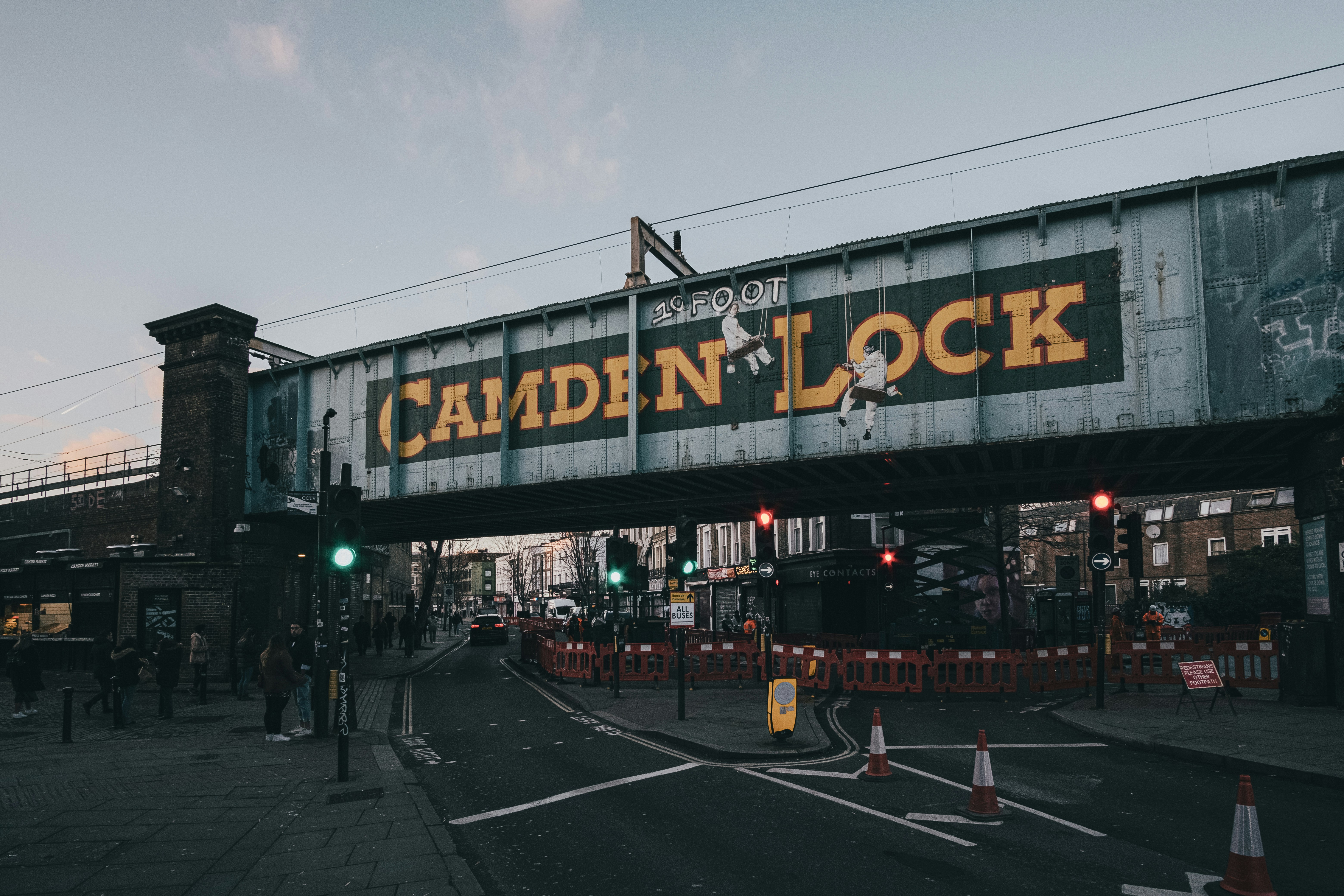 Camden Lock Bridge at Dusk: A Weathered Sign Over a Quiet City Street