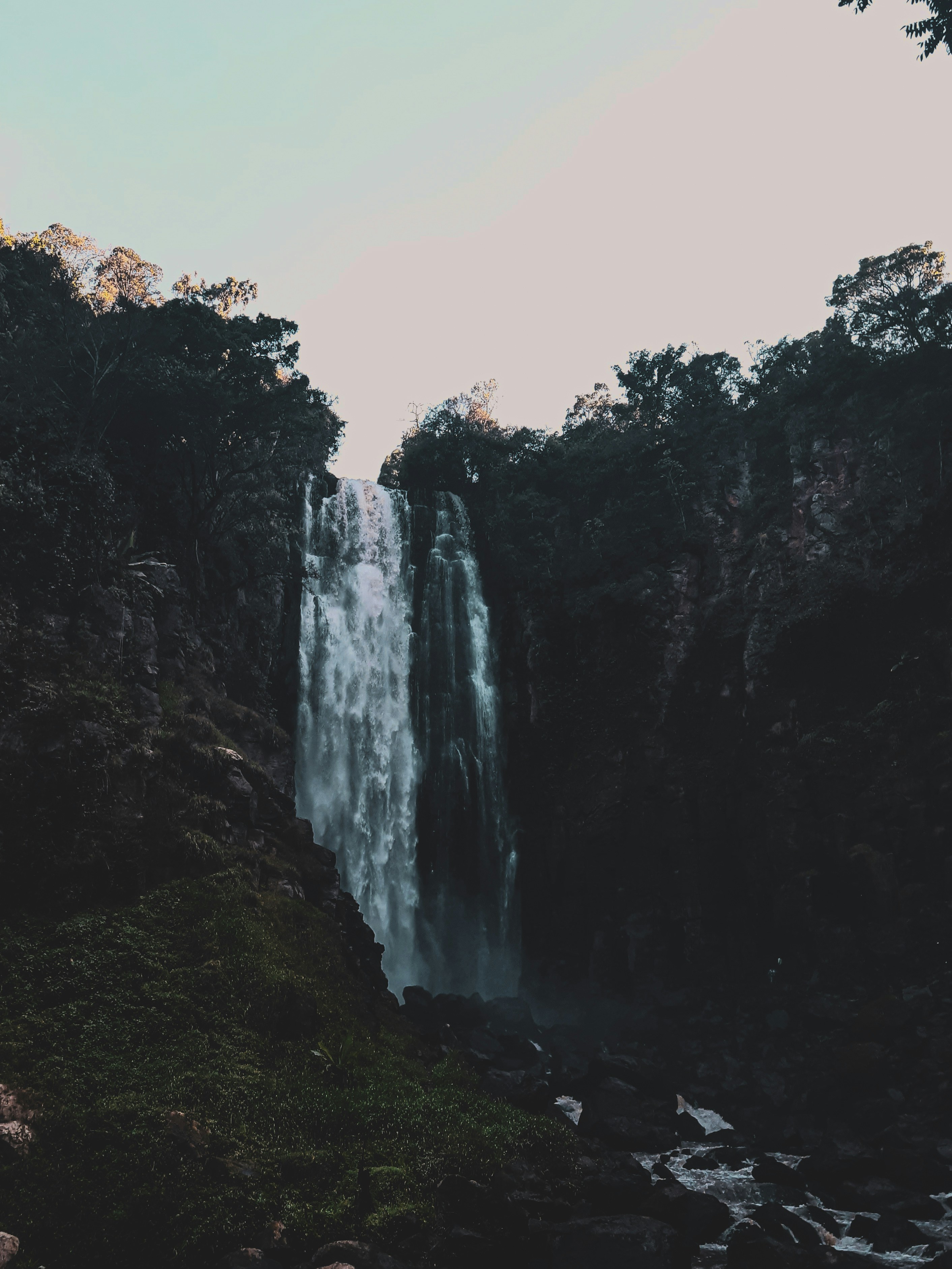 Chasm of Moss and Mist: The Hidden Falls at Dusk