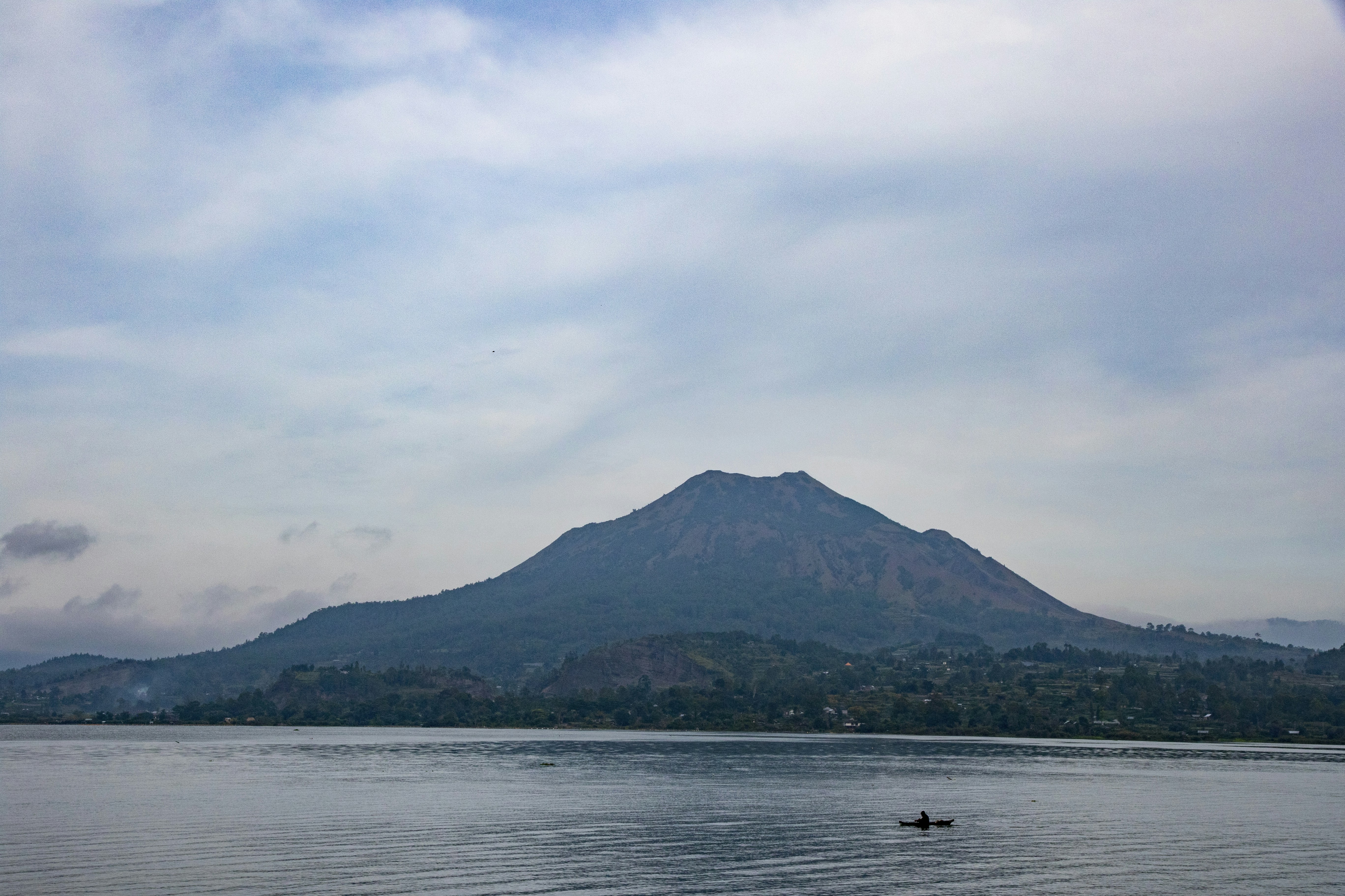 Conical Peak on a Calm Lake: A Quiet Meeting of Land and Water