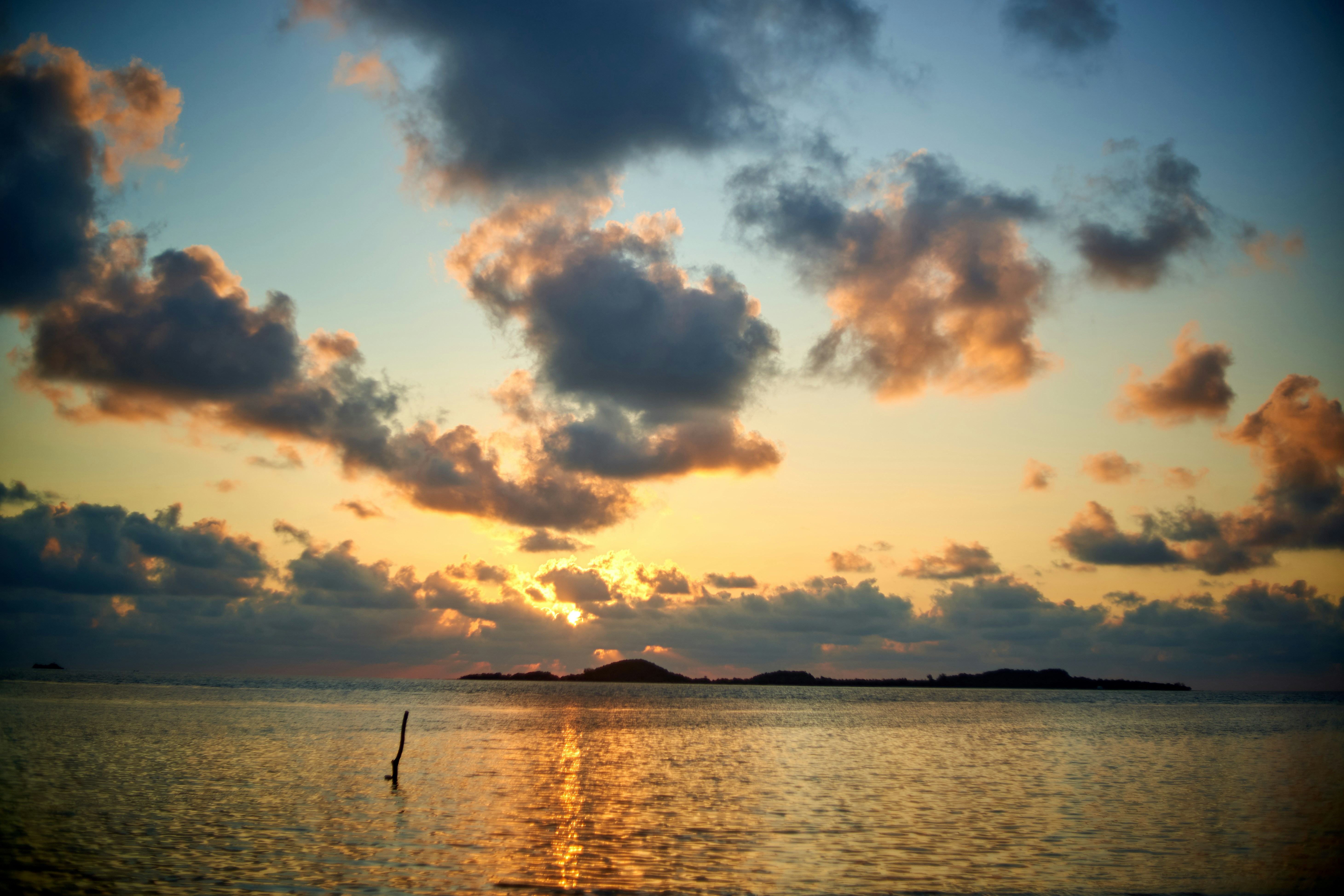 Body of water under cloudy sky during daytime photo – Free Tean island ...