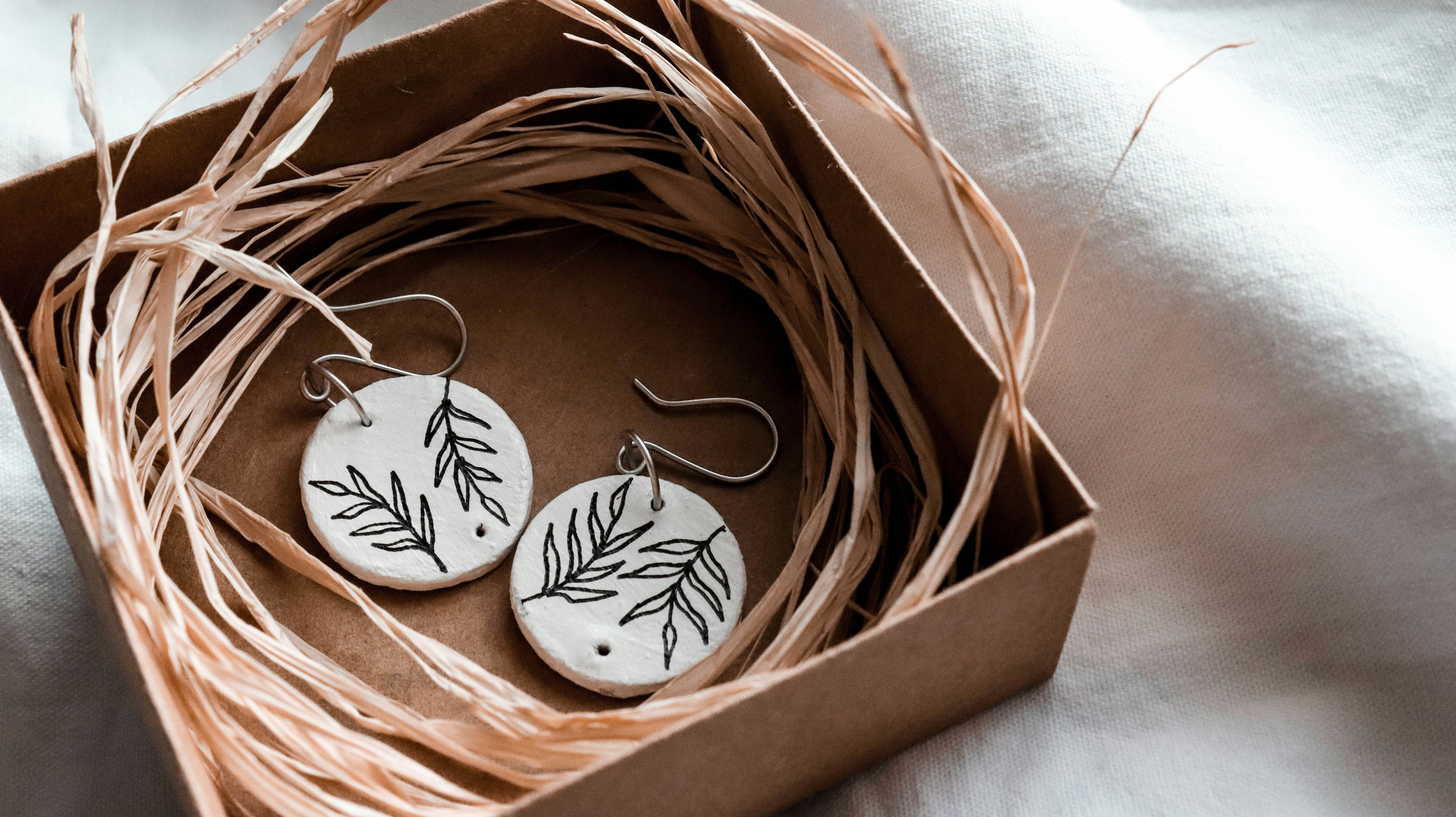 Minimalist Earrings: Delicate Leaves in a Cardboard Nest