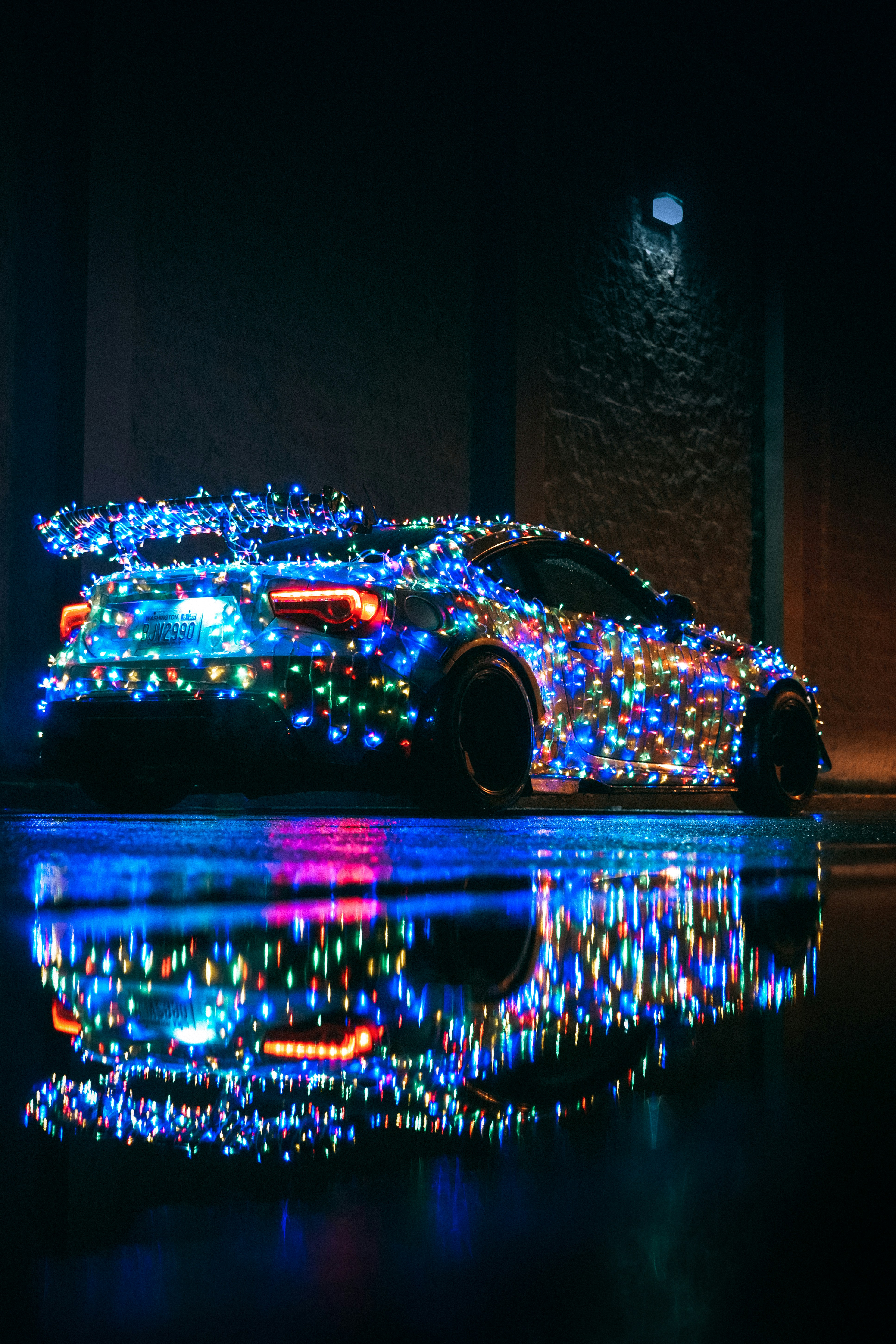blue car on road during night time