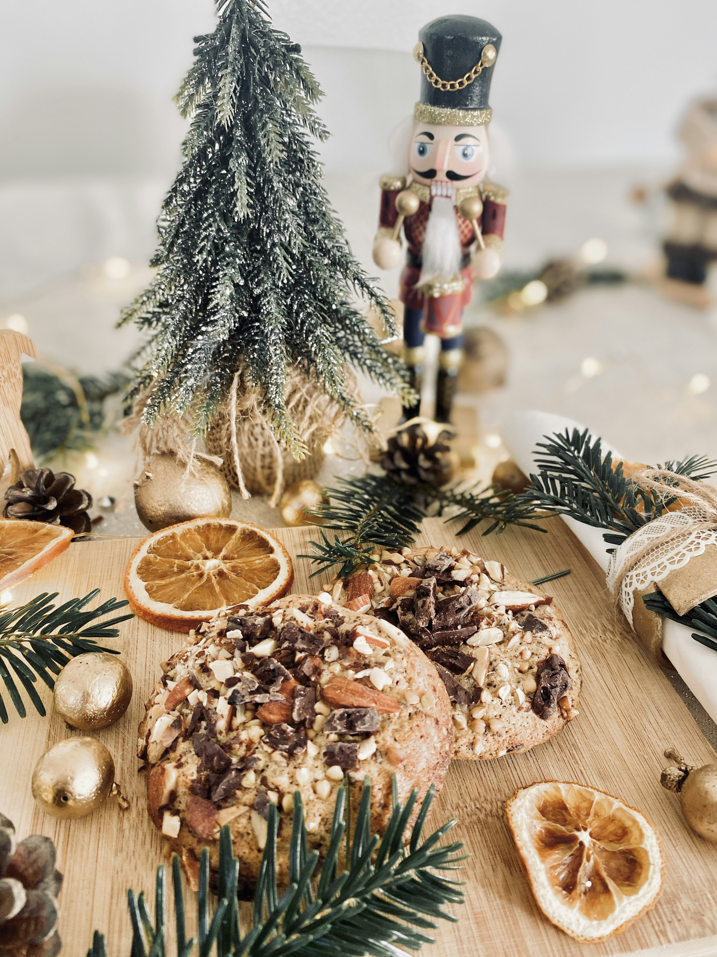 Nutty Holiday Loaves Framed by Frosted Fir and a Nutcracker Sentinel
