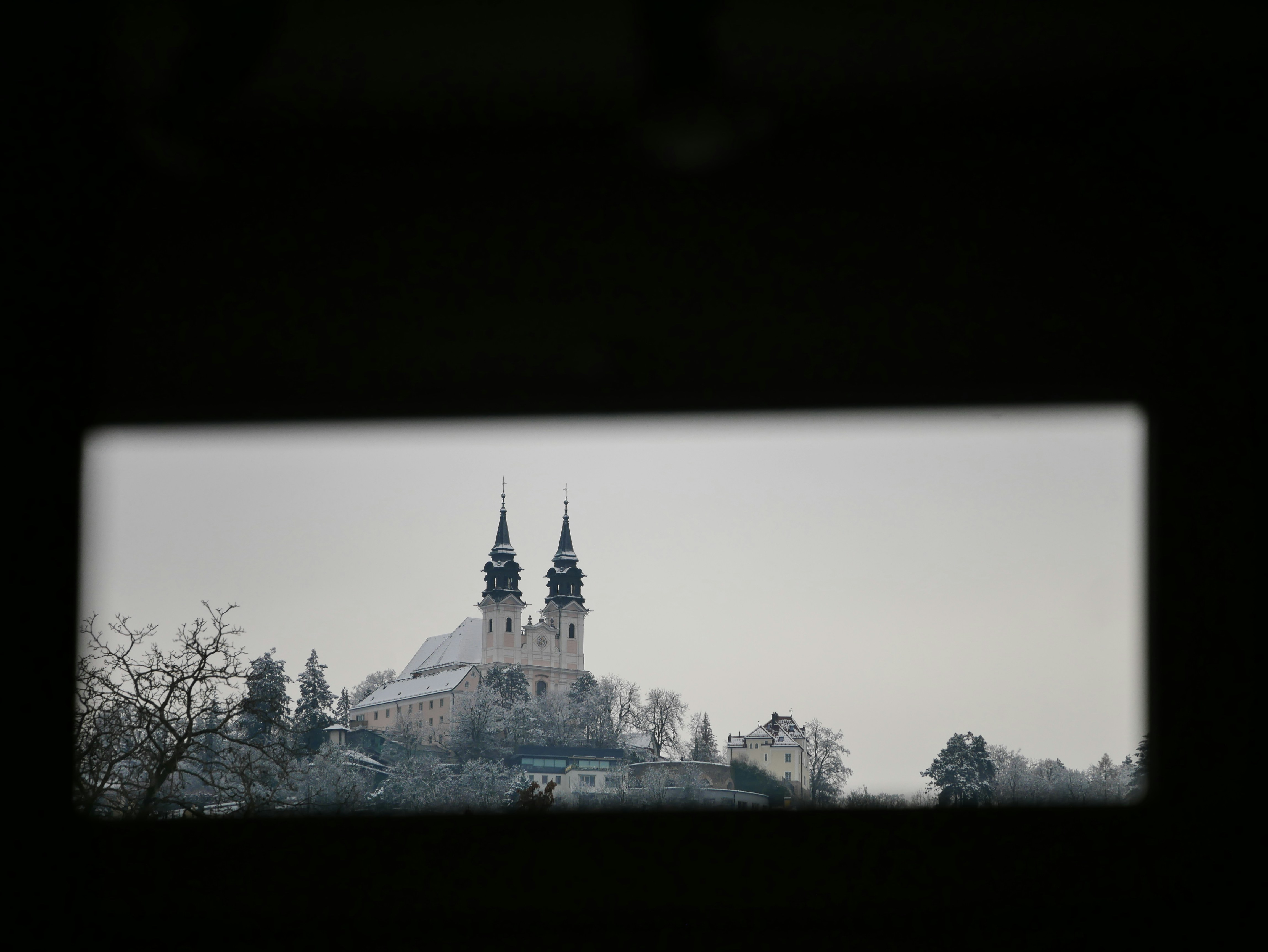 Framed Silhouette of Hilltop Spires