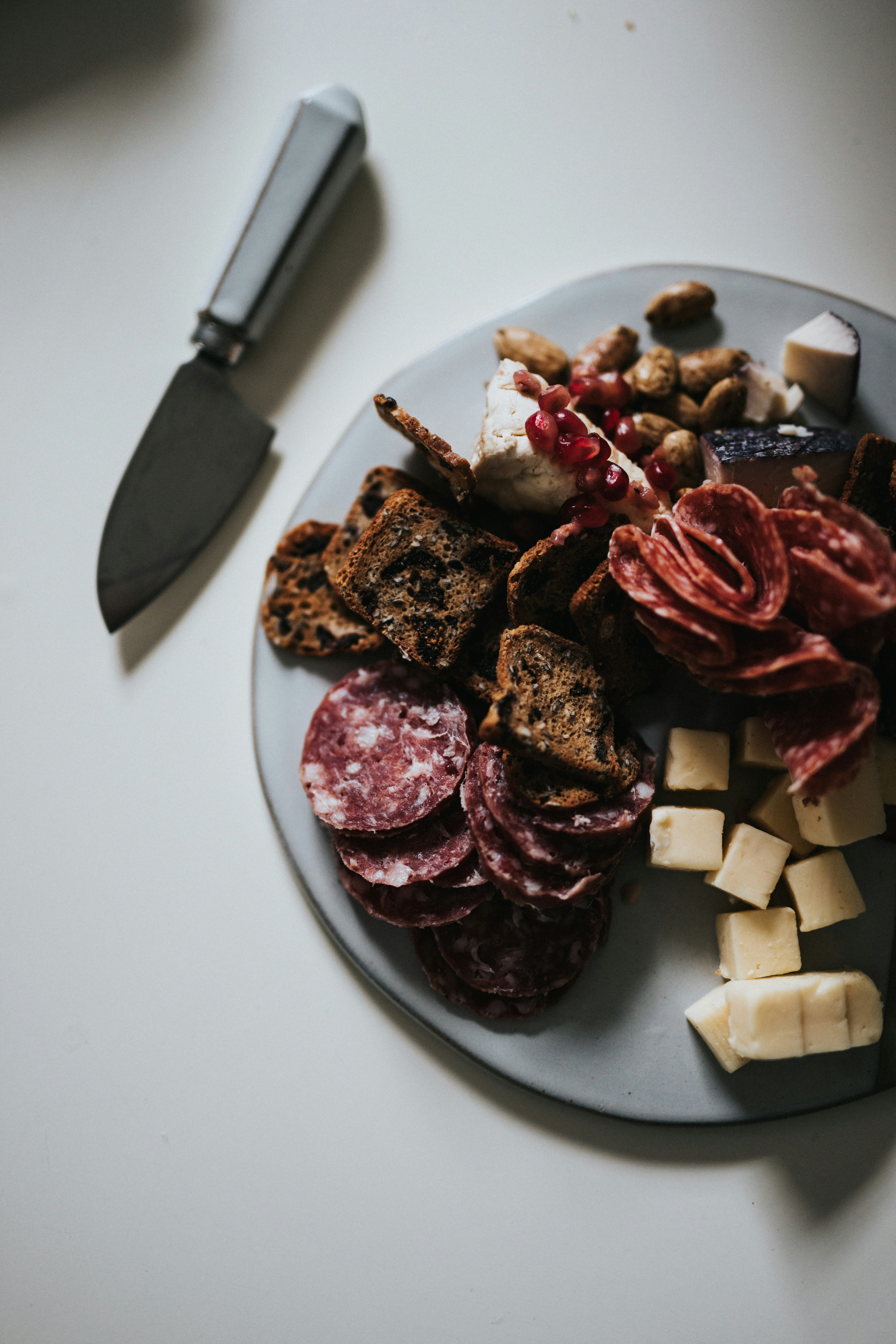 Boarded Plate: A Charcuterie Moment with Pepperoni, Cheeses, and Toasted Breads