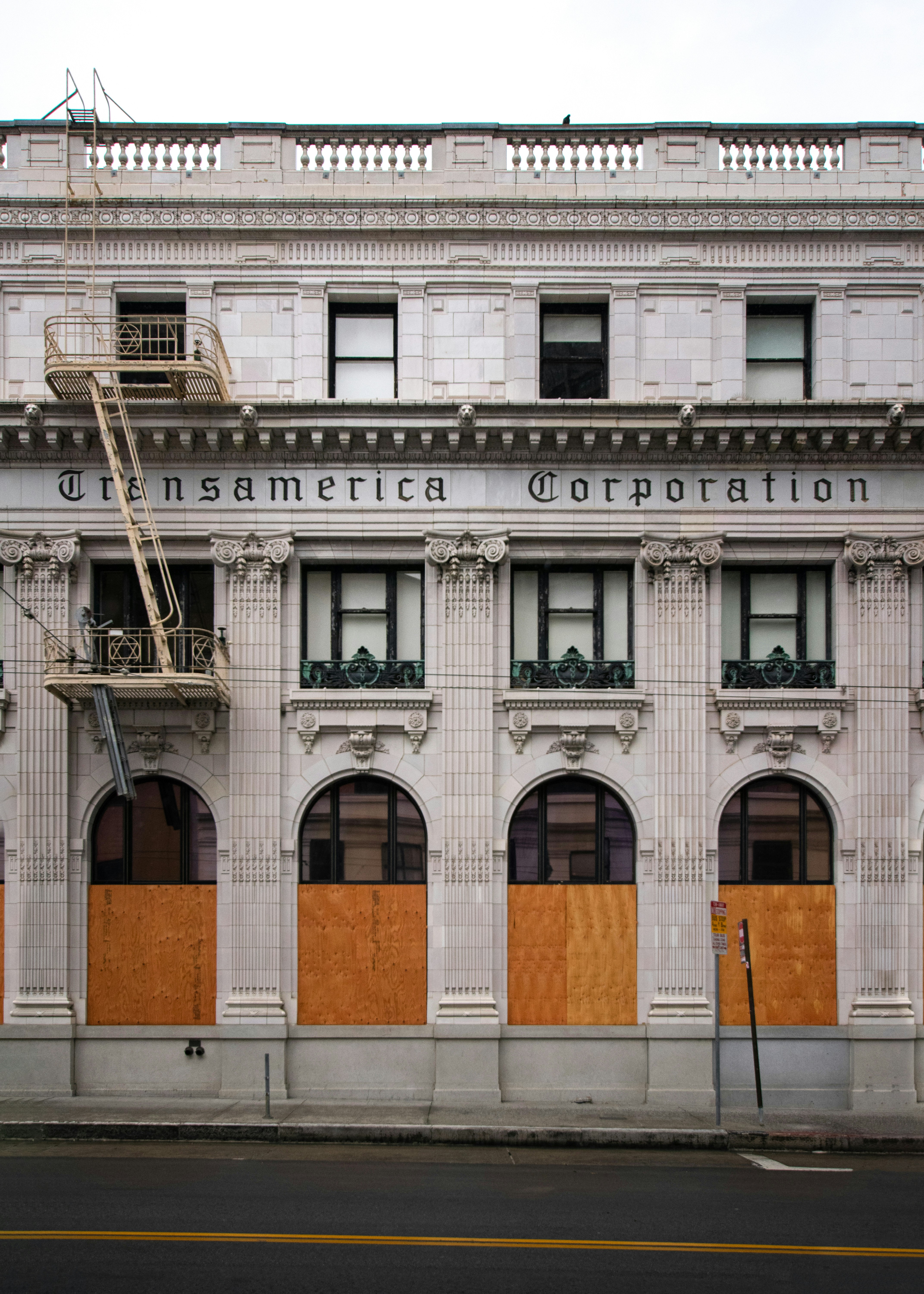 Facade of a Historic Commercial Building with Boarded Windows