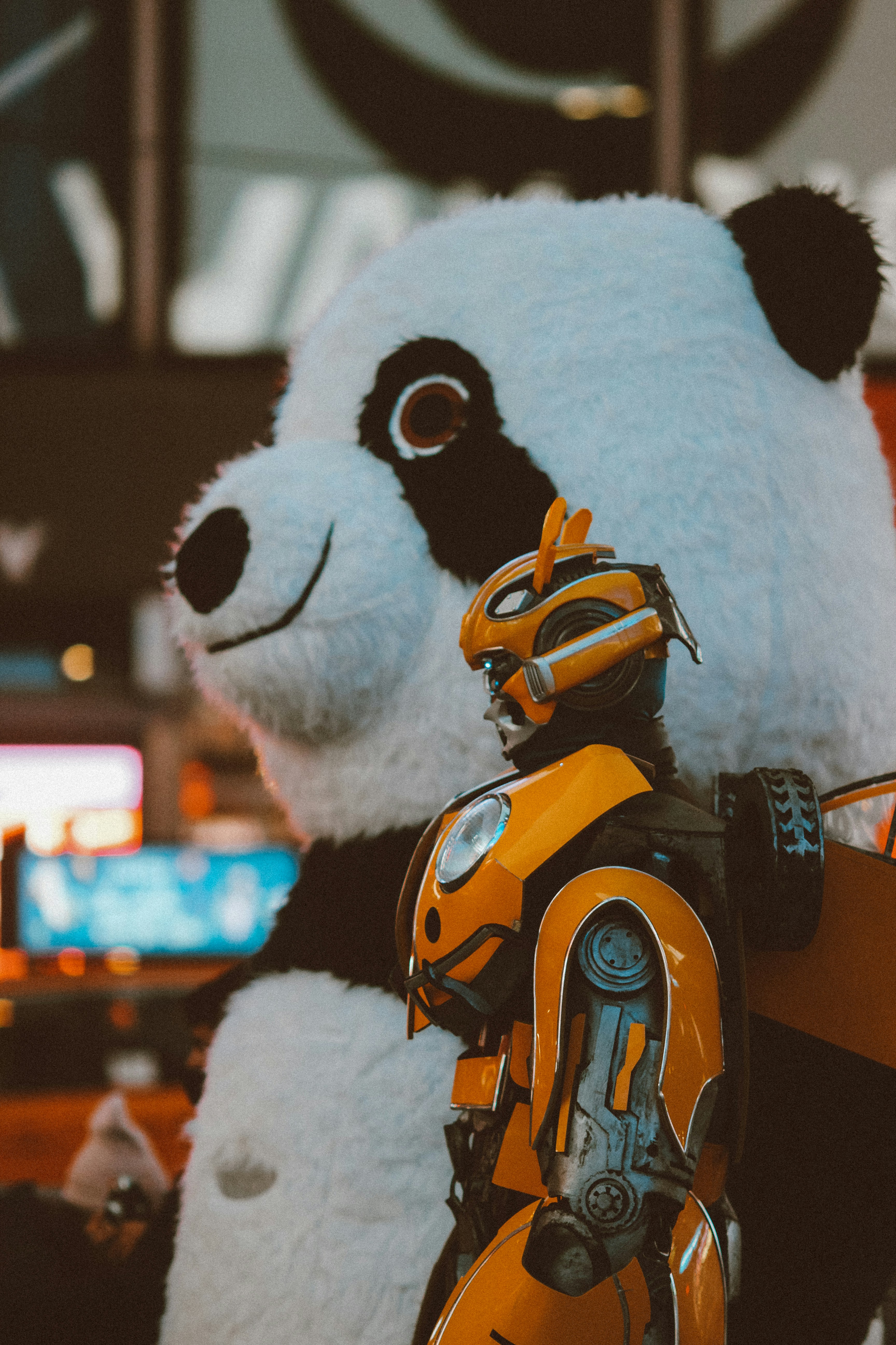 Giant Panda Meets Neon Ranger: A Plush Backdrop and Mecha in a City Night