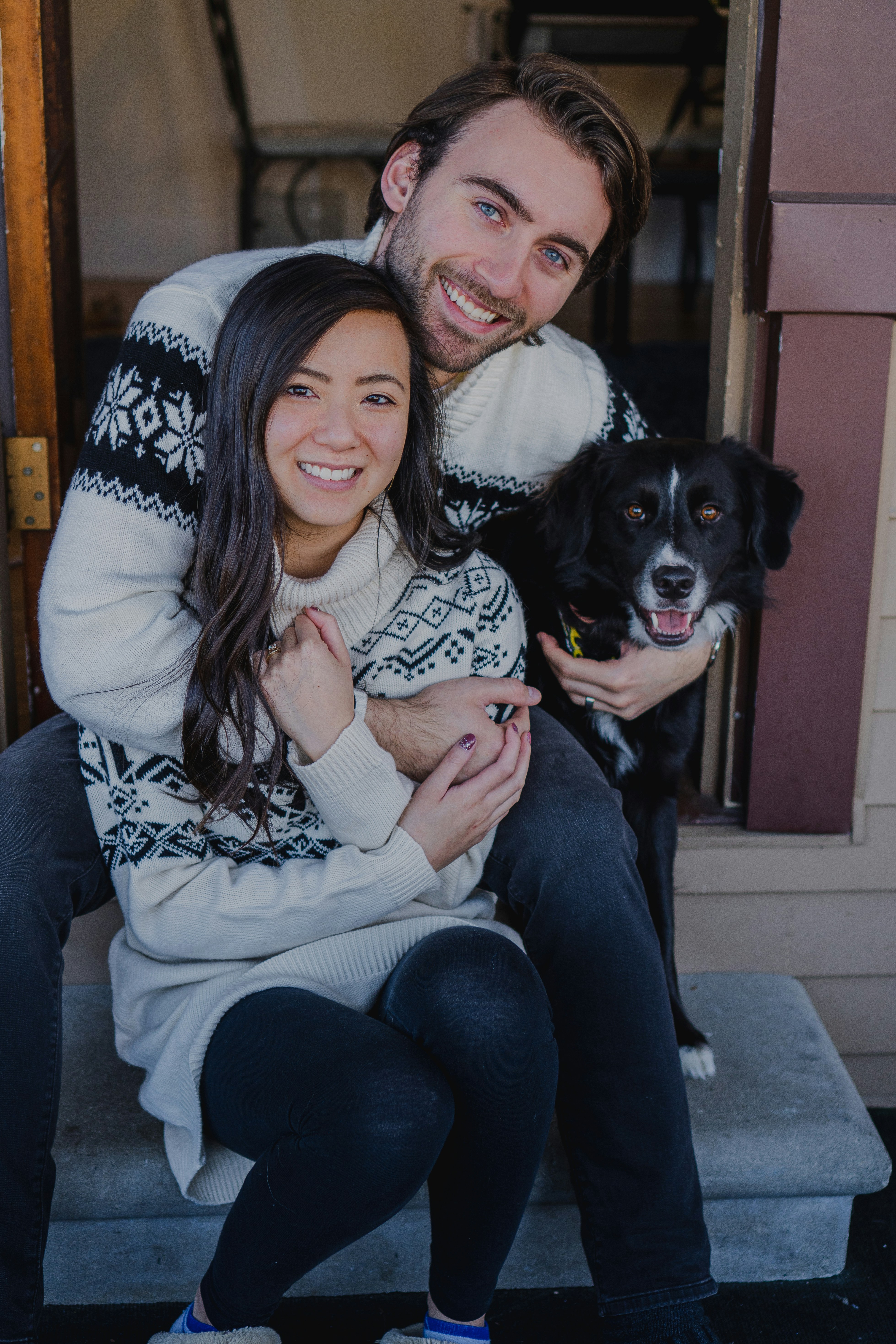 On the Porch: A Warm Moment Between a Couple and Their Dog