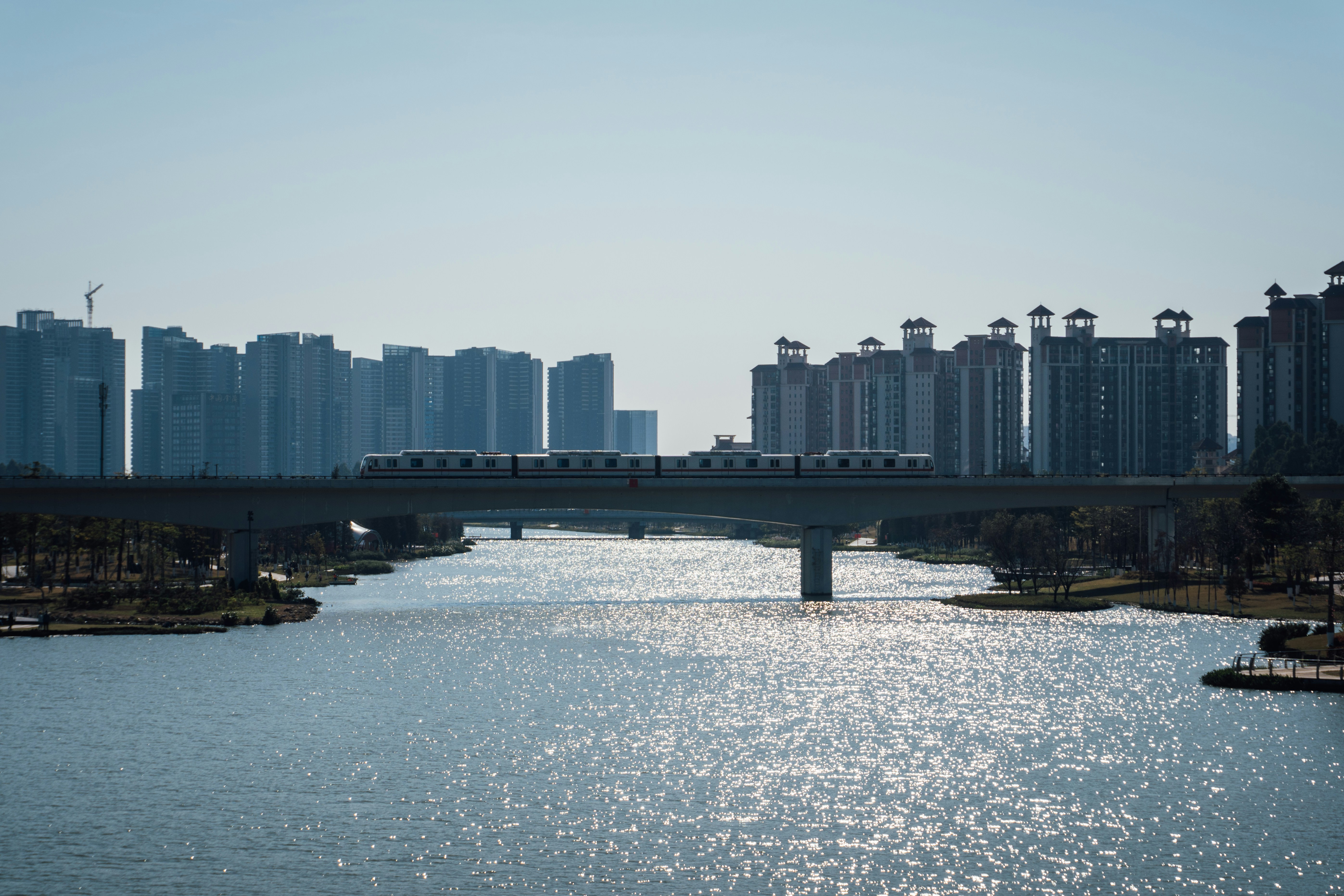 City skyline across body of water during daytime photo – Free ...