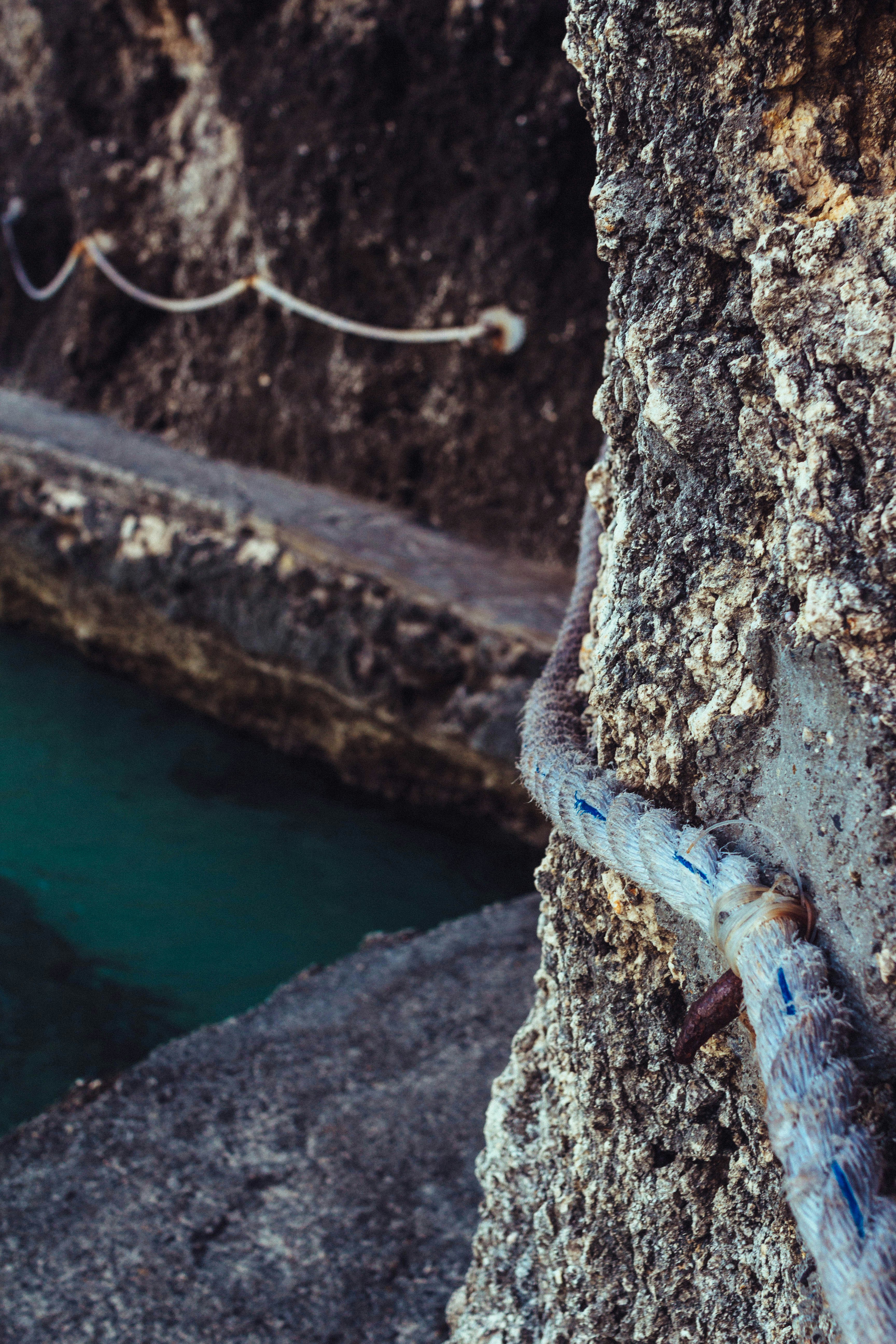 Rope Framing the Edge: Weathered Lines by the Cliff