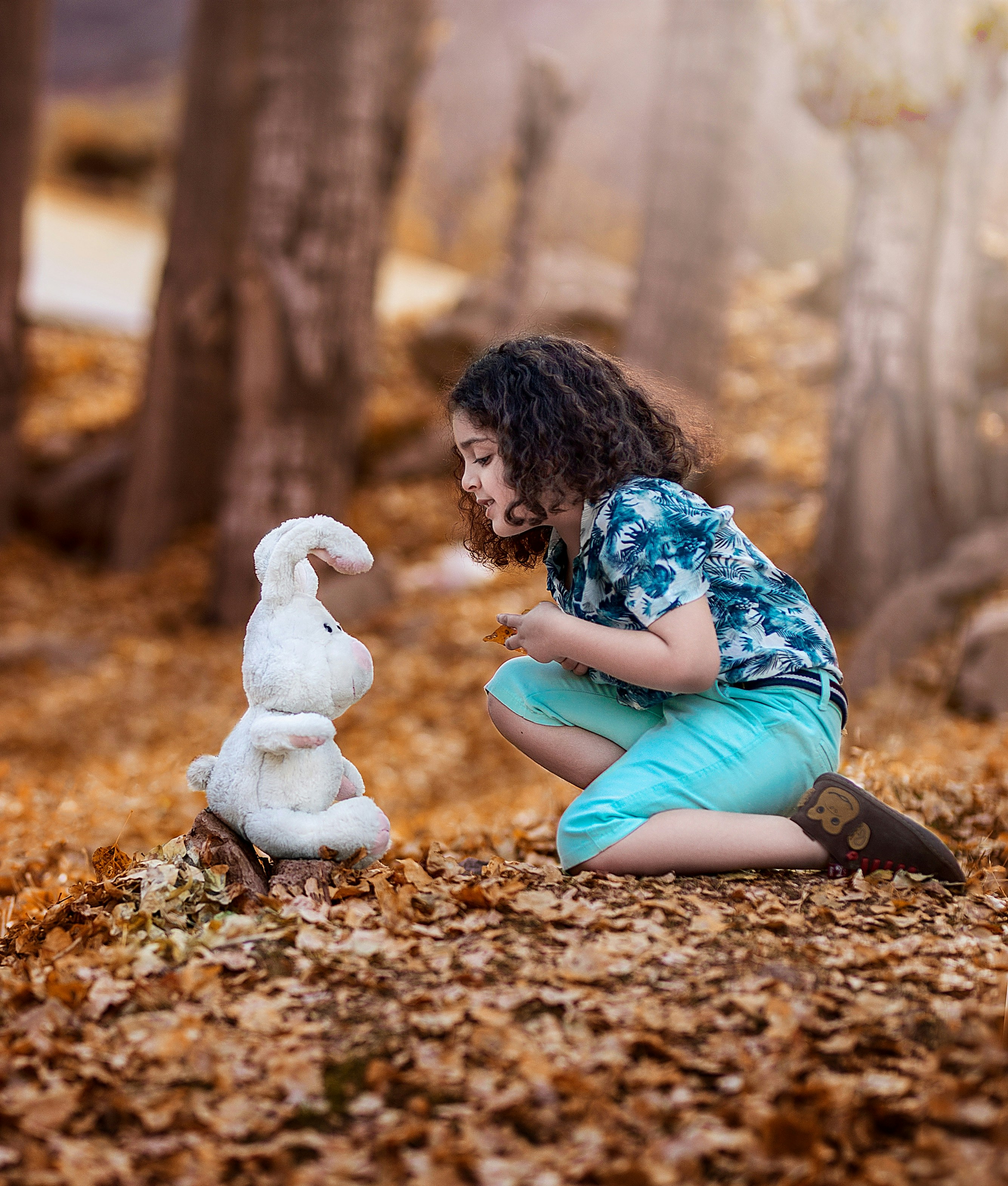 Woman in blue dress sitting on ground photo – Free Portrait Image on ...