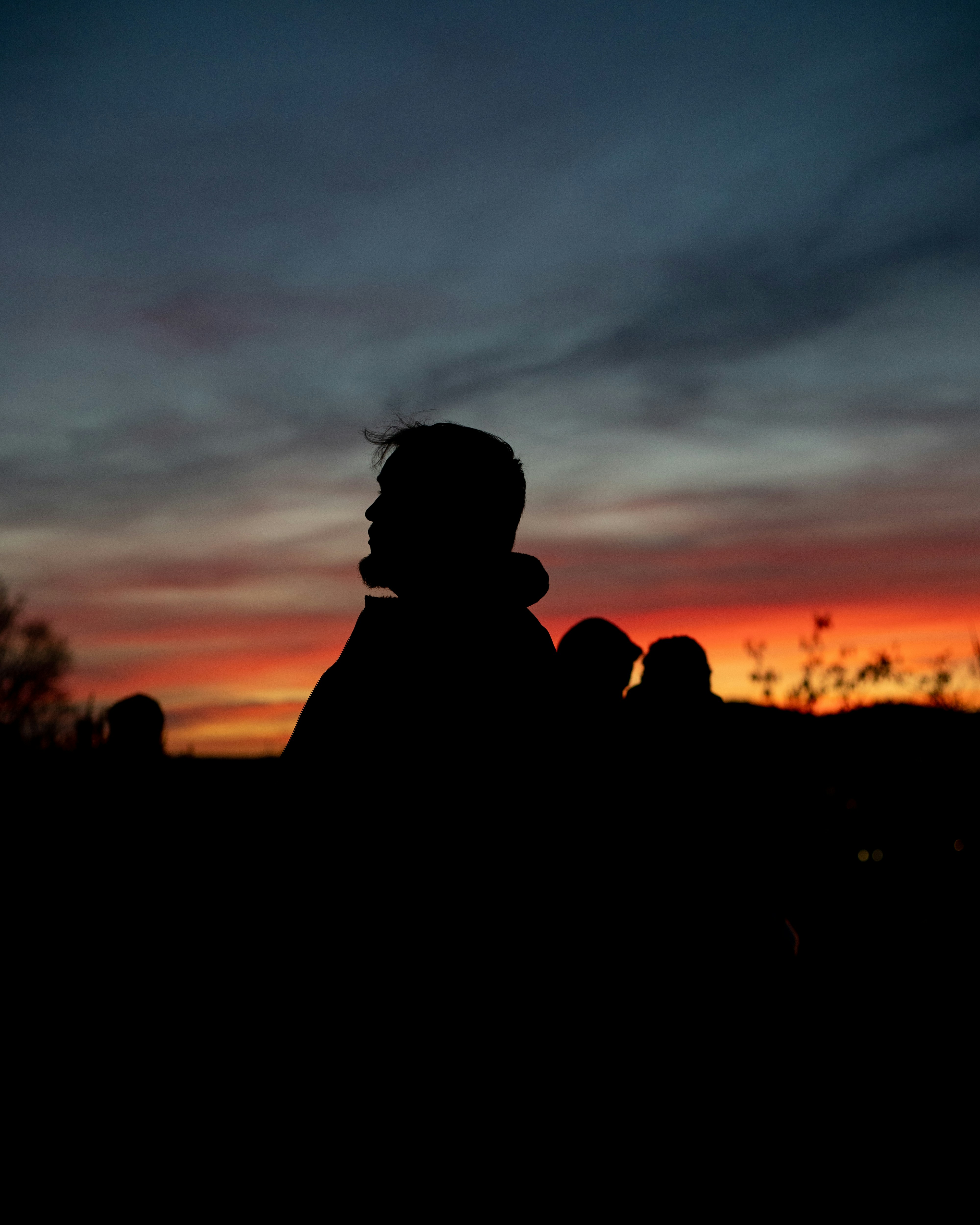 Silhouette of man standing during sunset photo – Free Human Image on ...