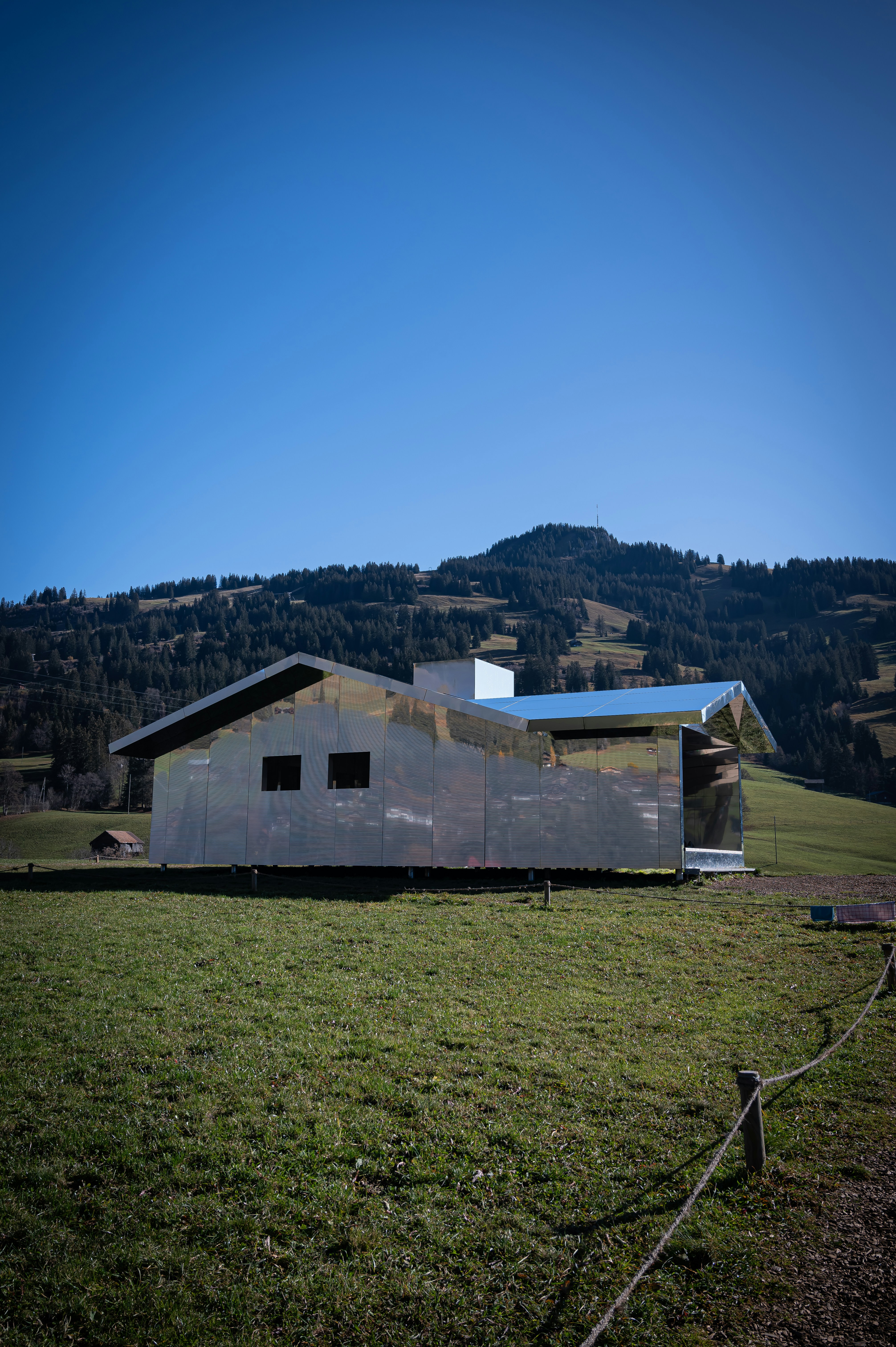 Alpine Mirror Chalet in a Meadow