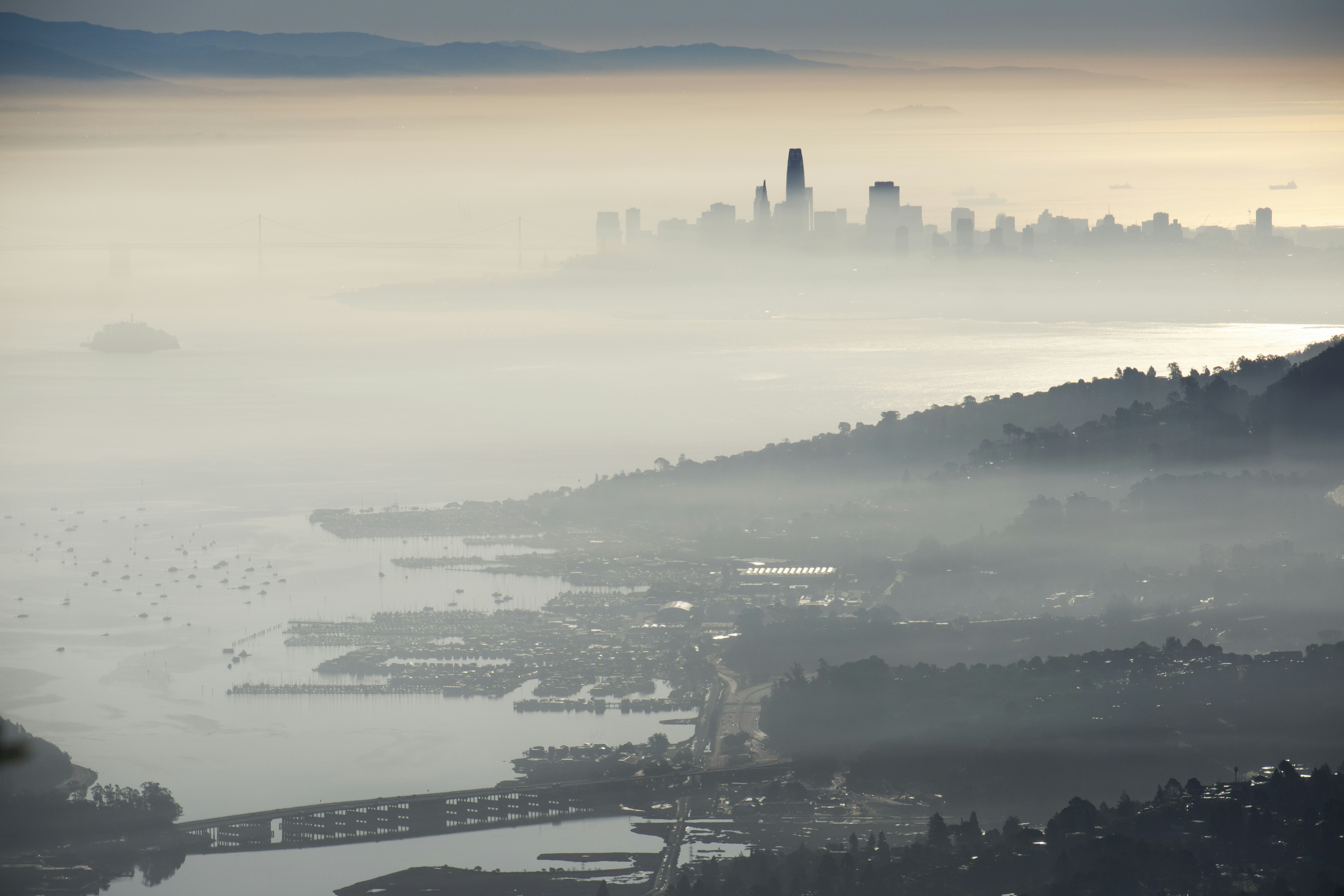 Veiled Dawn Over the Fog-Washed Skyline