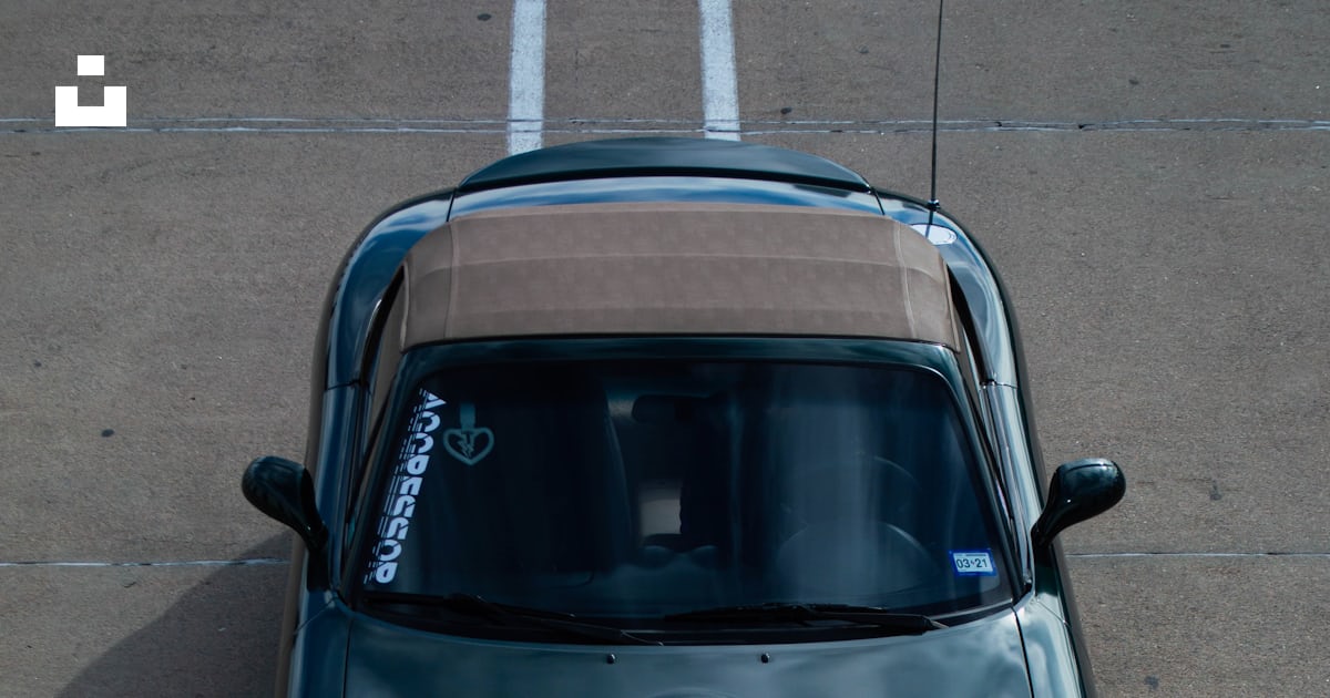 Black Volkswagen Beetle Parked On Sidewalk During Daytime Photo Free