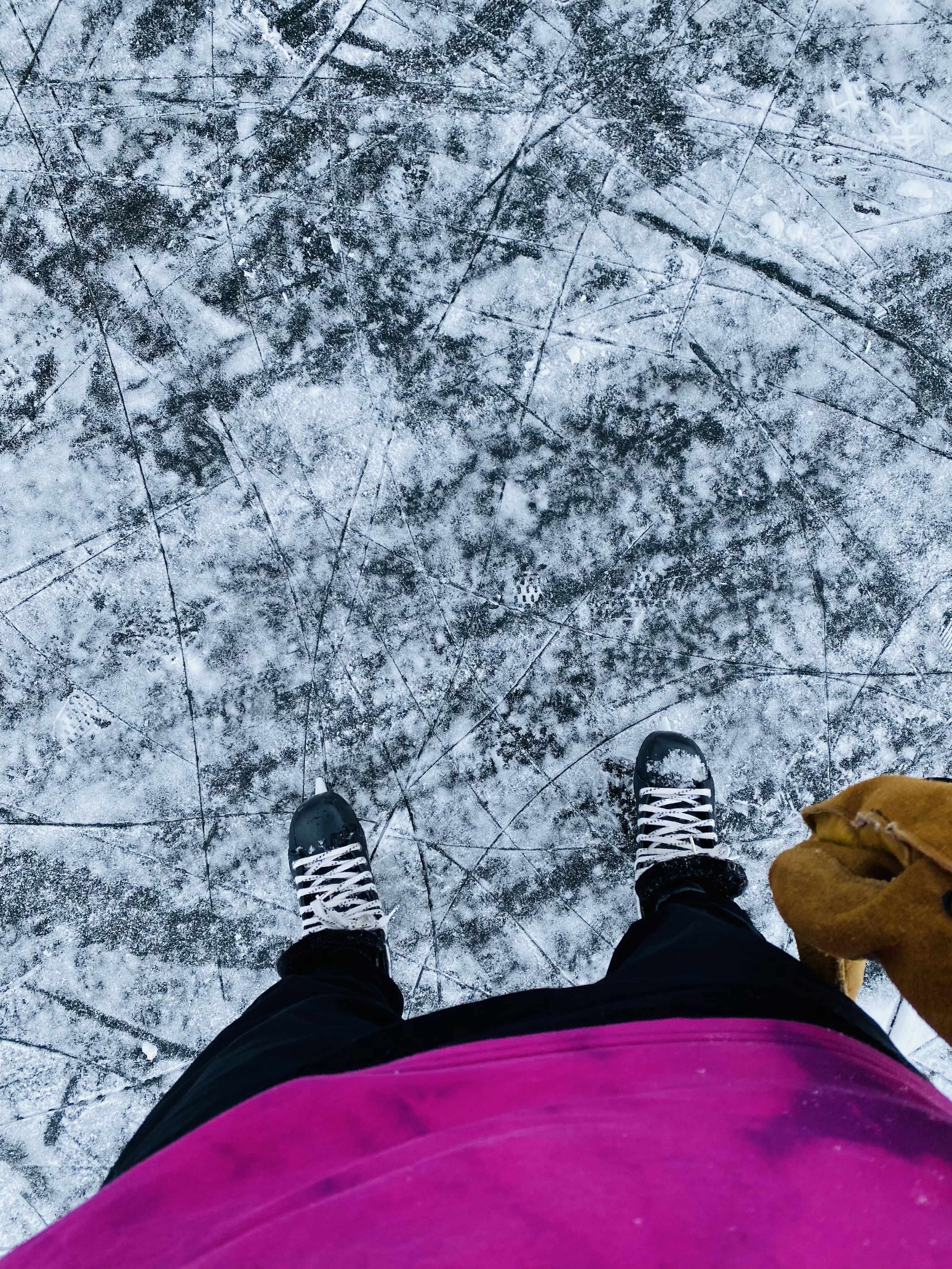 Crackled Ice Underfoot: A Pink-Top View from Above