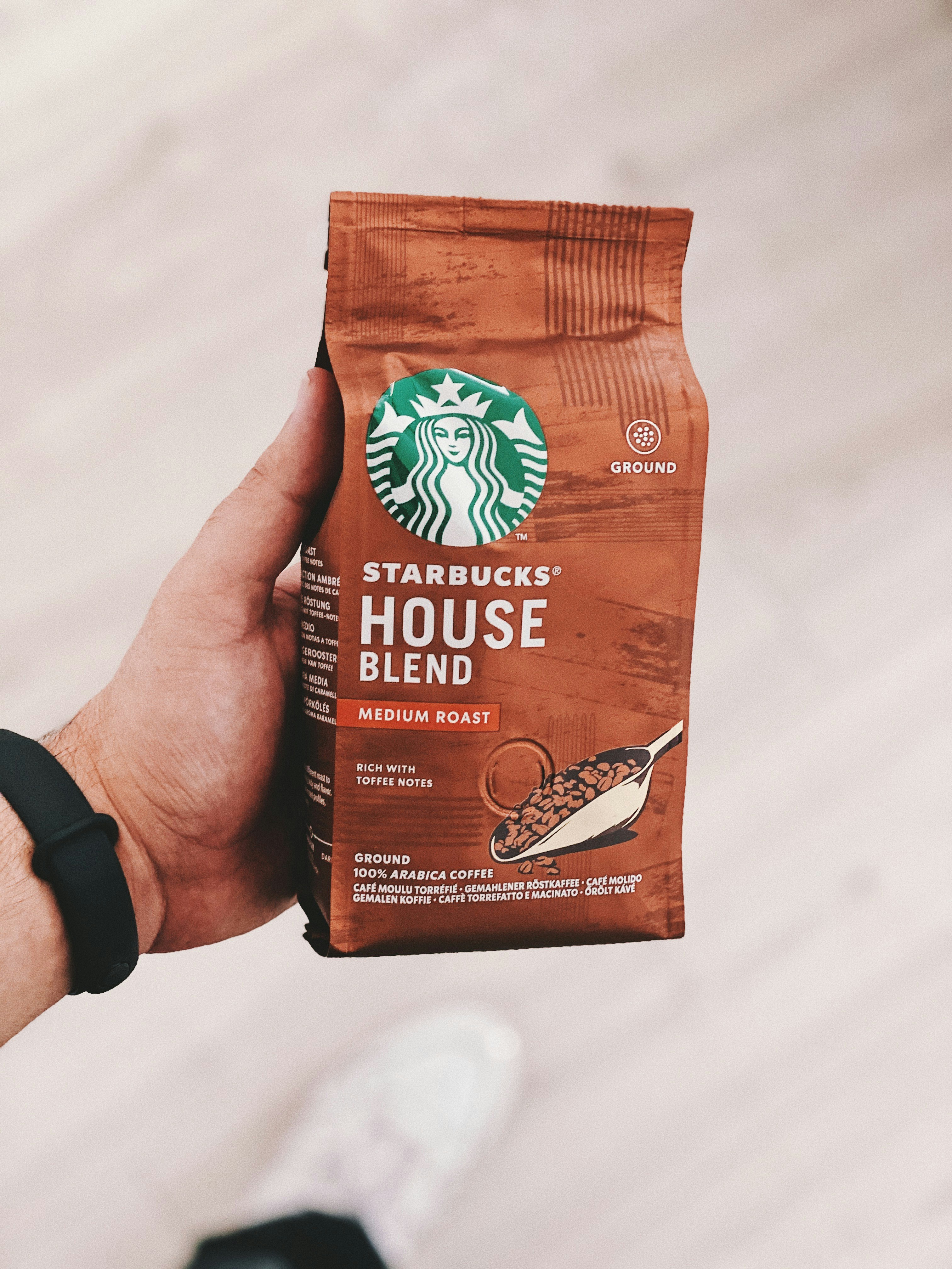 Person holding the coffee bean pack photo – Free Food Image on Unsplash