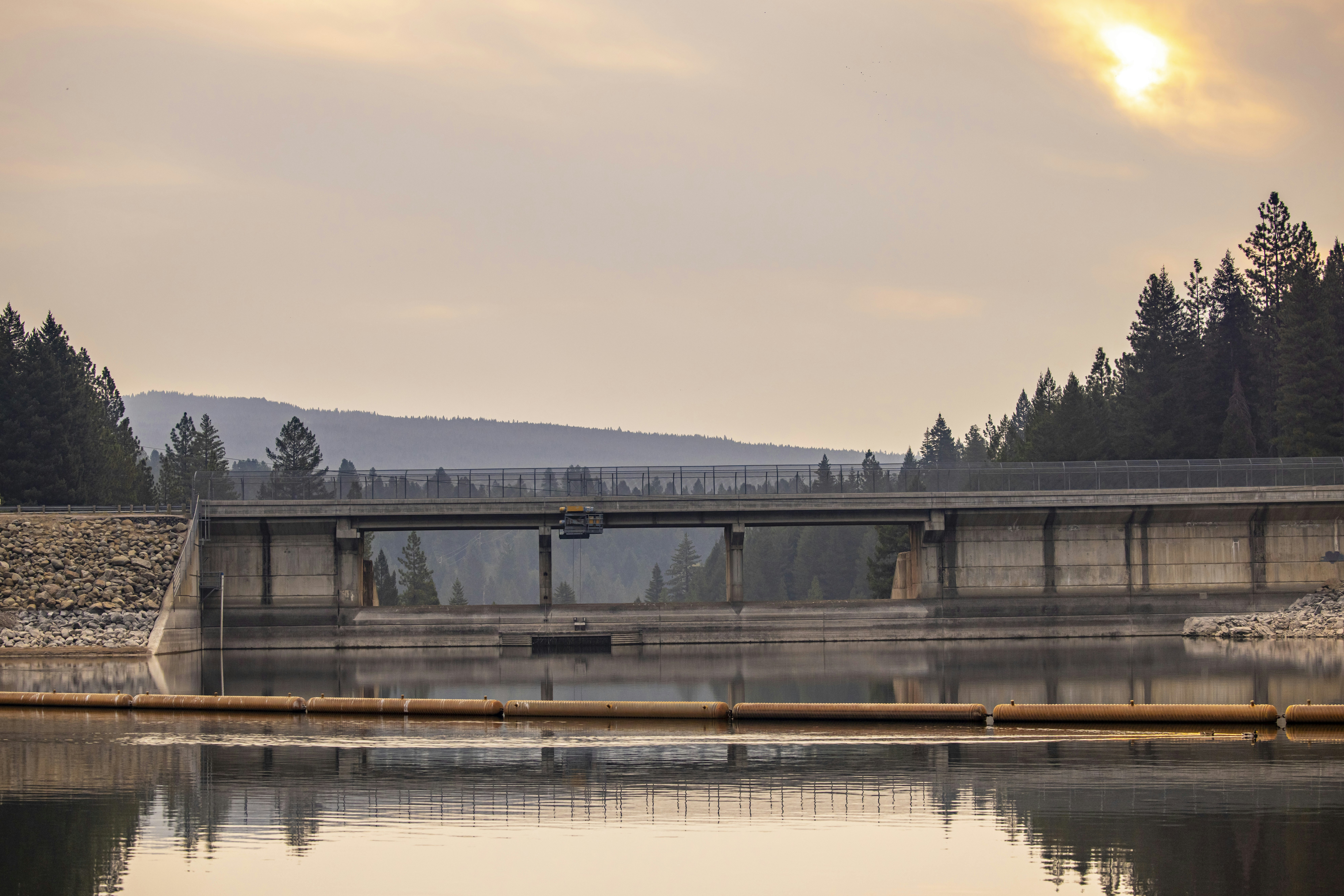 Gray concrete bridge over river during daytime photo – Free Grey Image ...