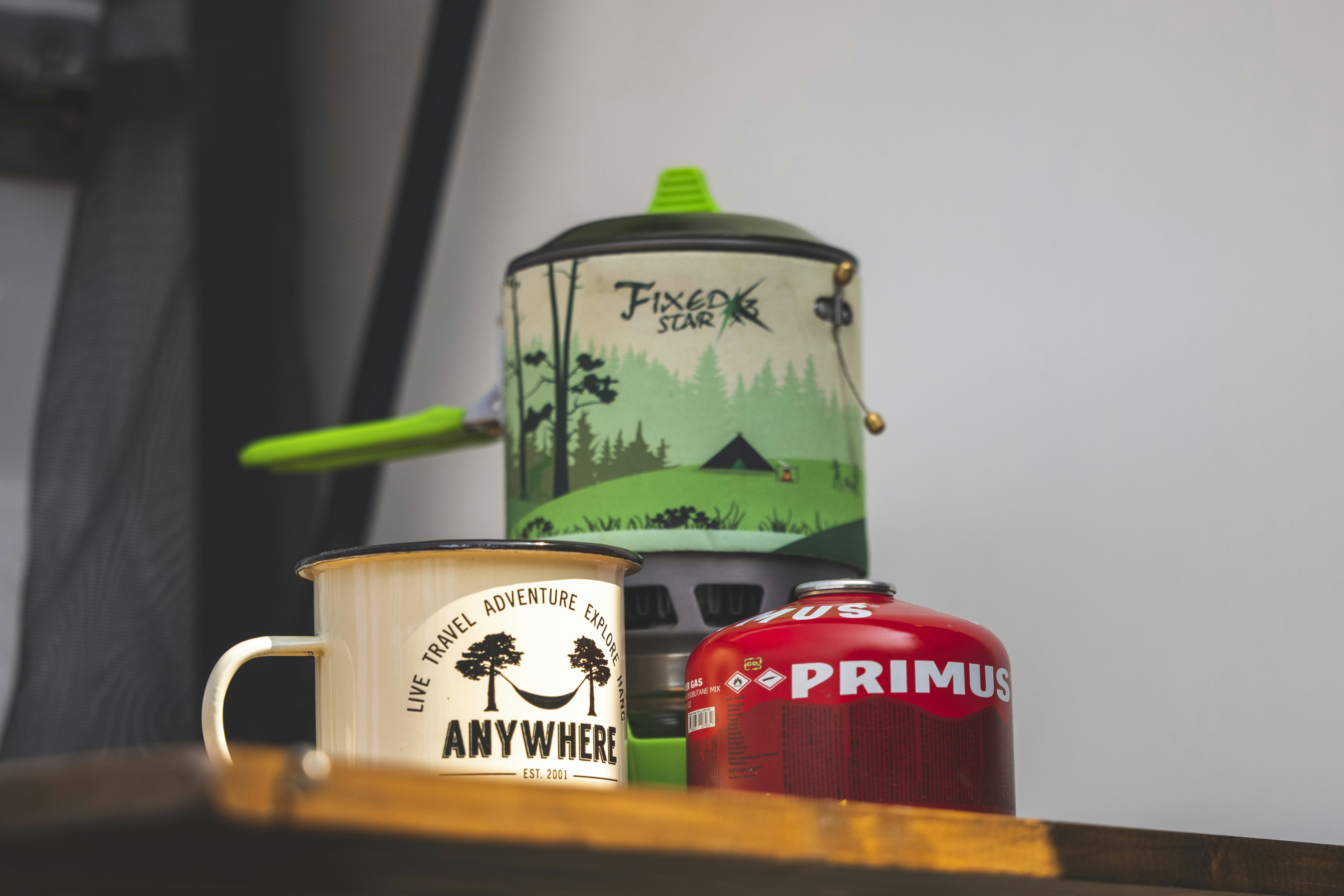 Forest Tin on a Triad of Enamel Mugs