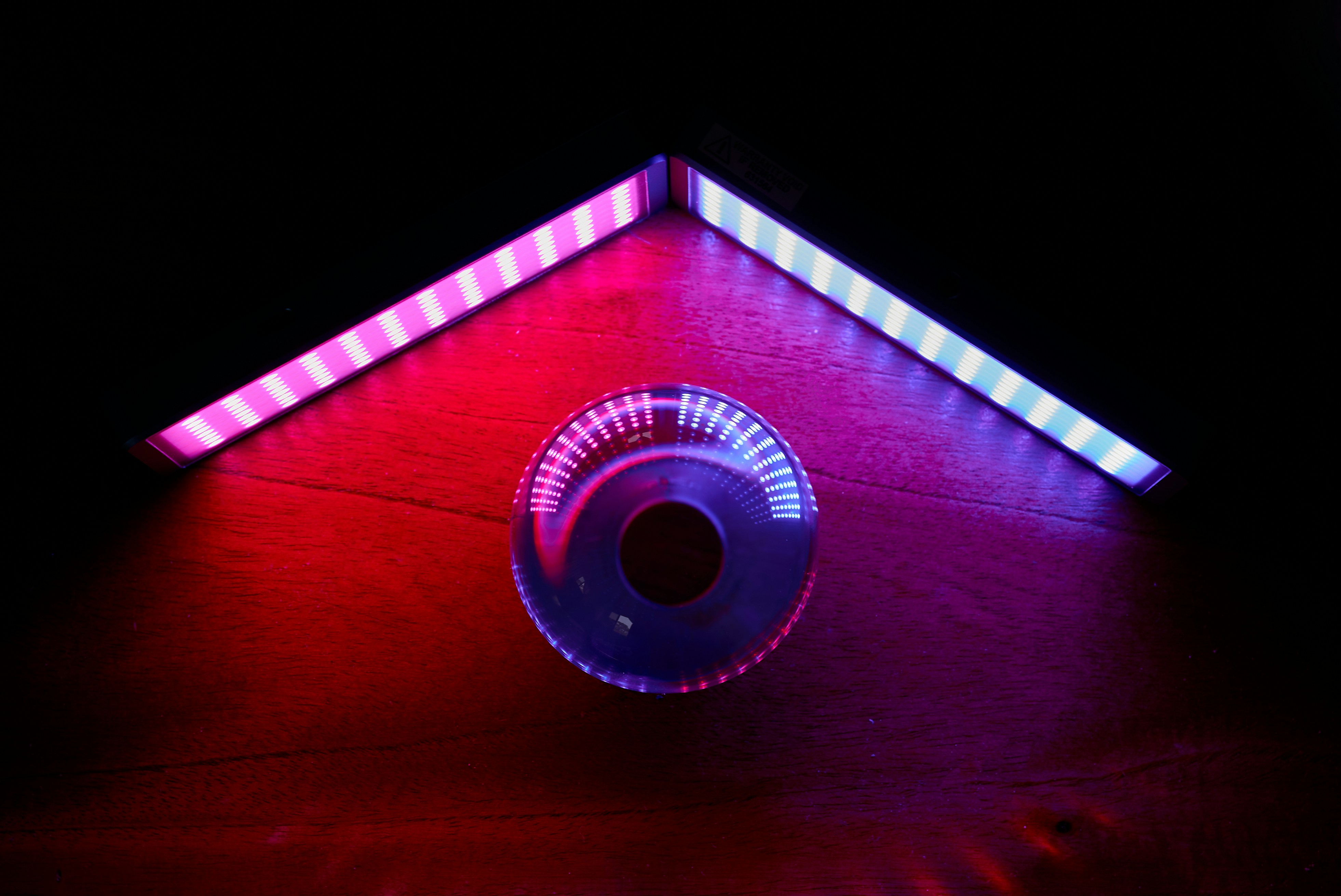 Neon Ring Over Vivid Prism: A Night Study in Color and Geometry