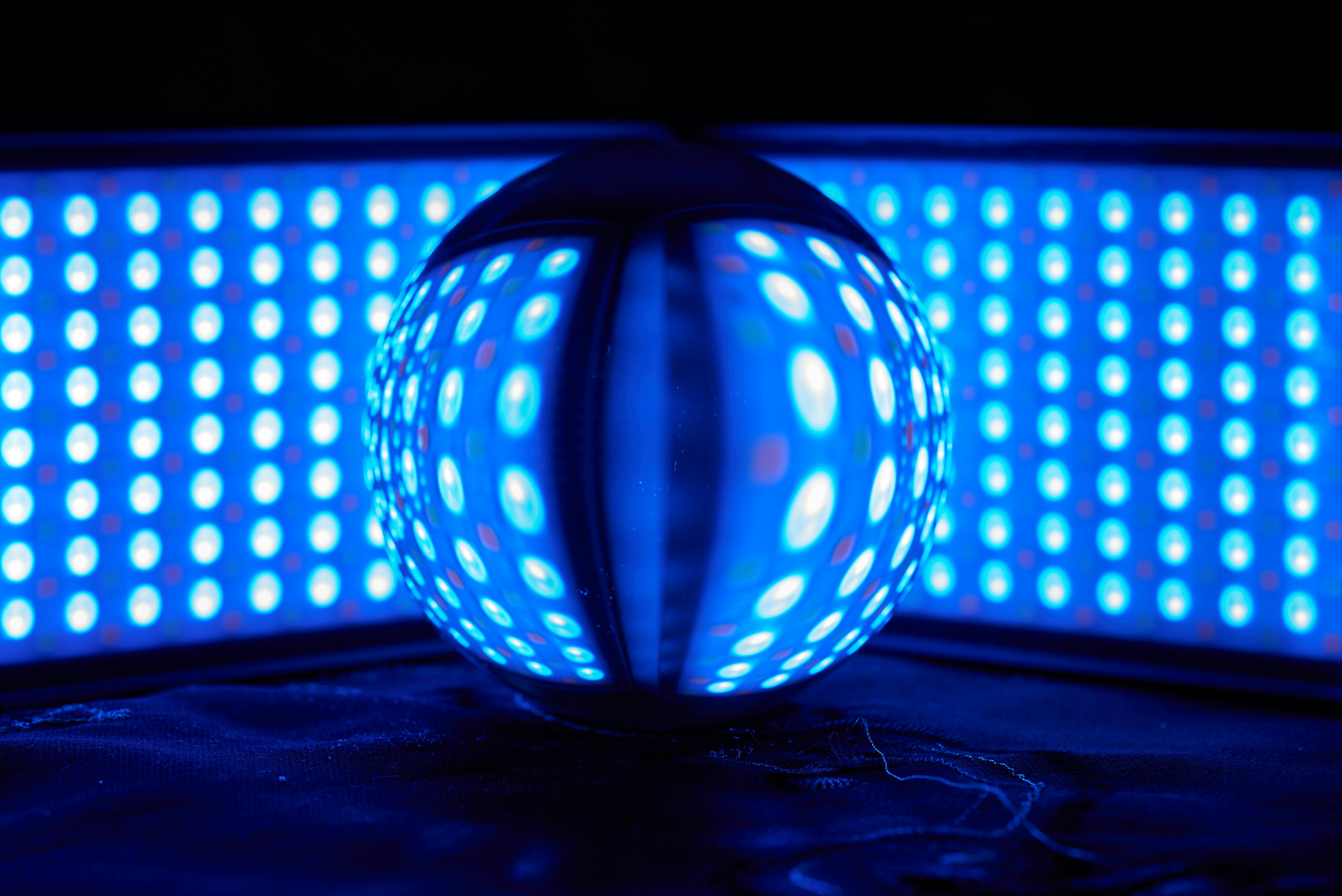 Blue and white ball on black surface photo – Free Blue Image on Unsplash