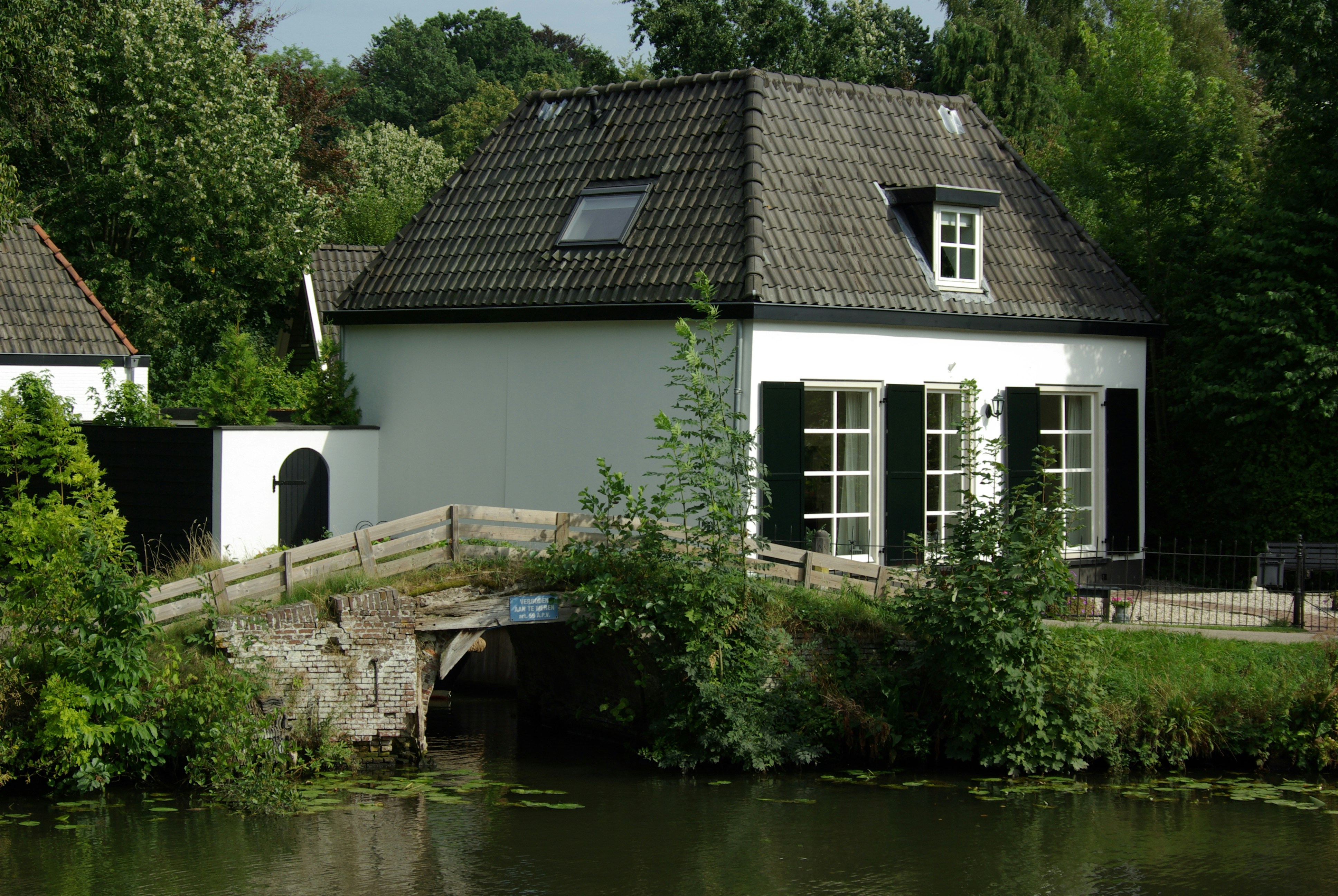 White and black house beside river photo – Free Grey Image on Unsplash