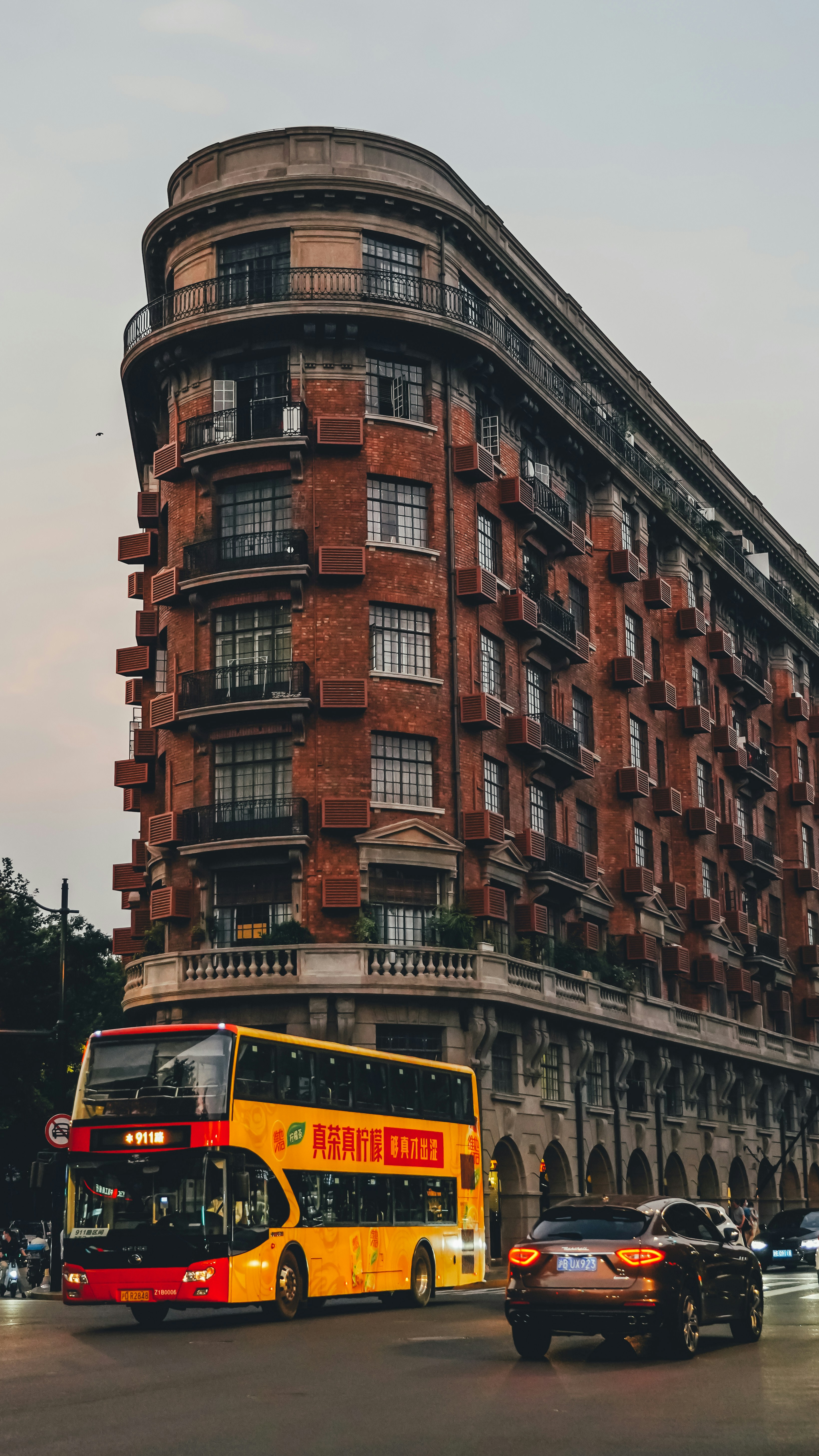 Historic Brick Corner Watchtower Overlooking a Busy Street