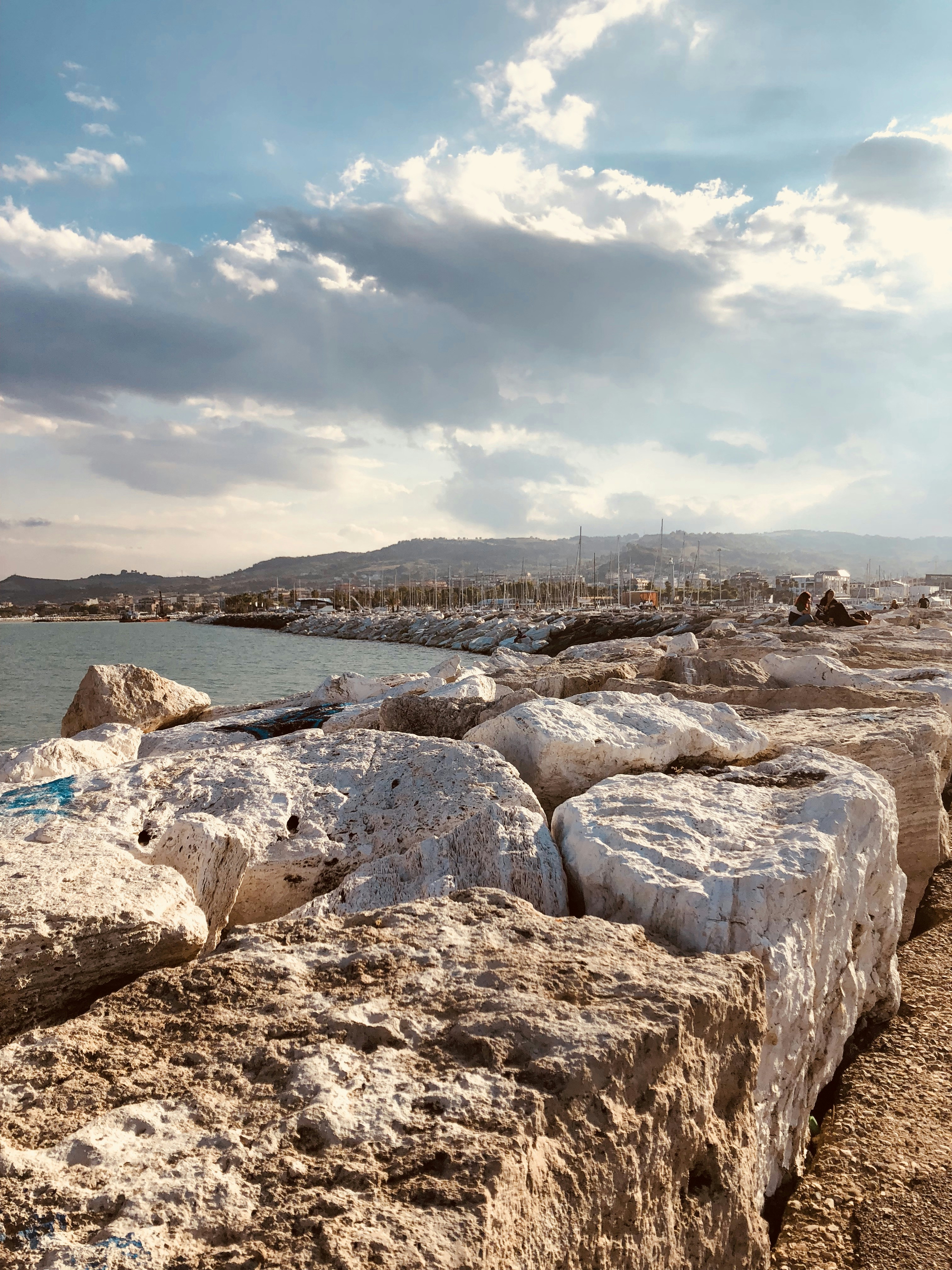 Gray rocky shore under white cloudy sky during daytime photo – Free San ...