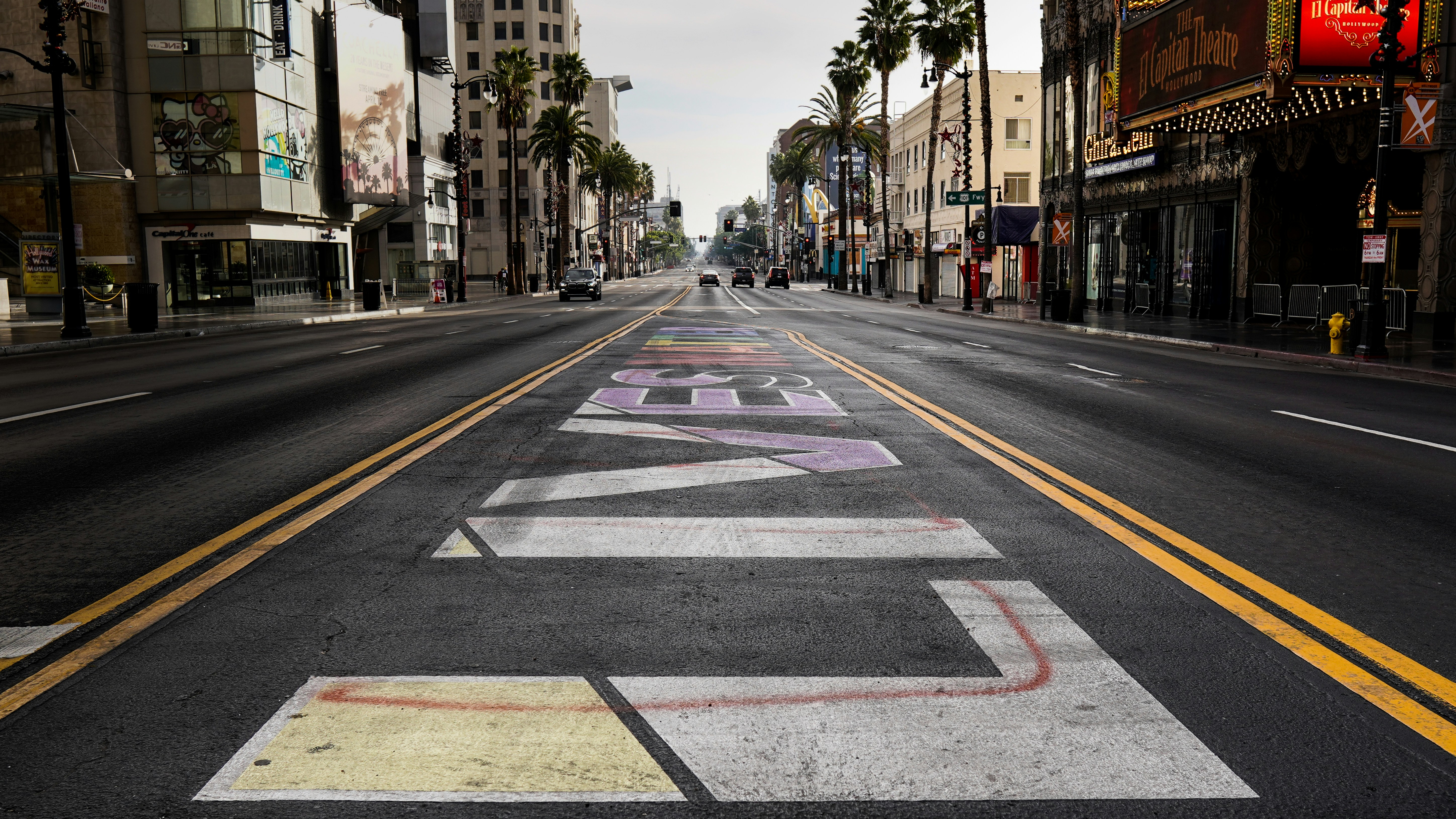 Converging Lines on a City Street Toward the Distant Skyline