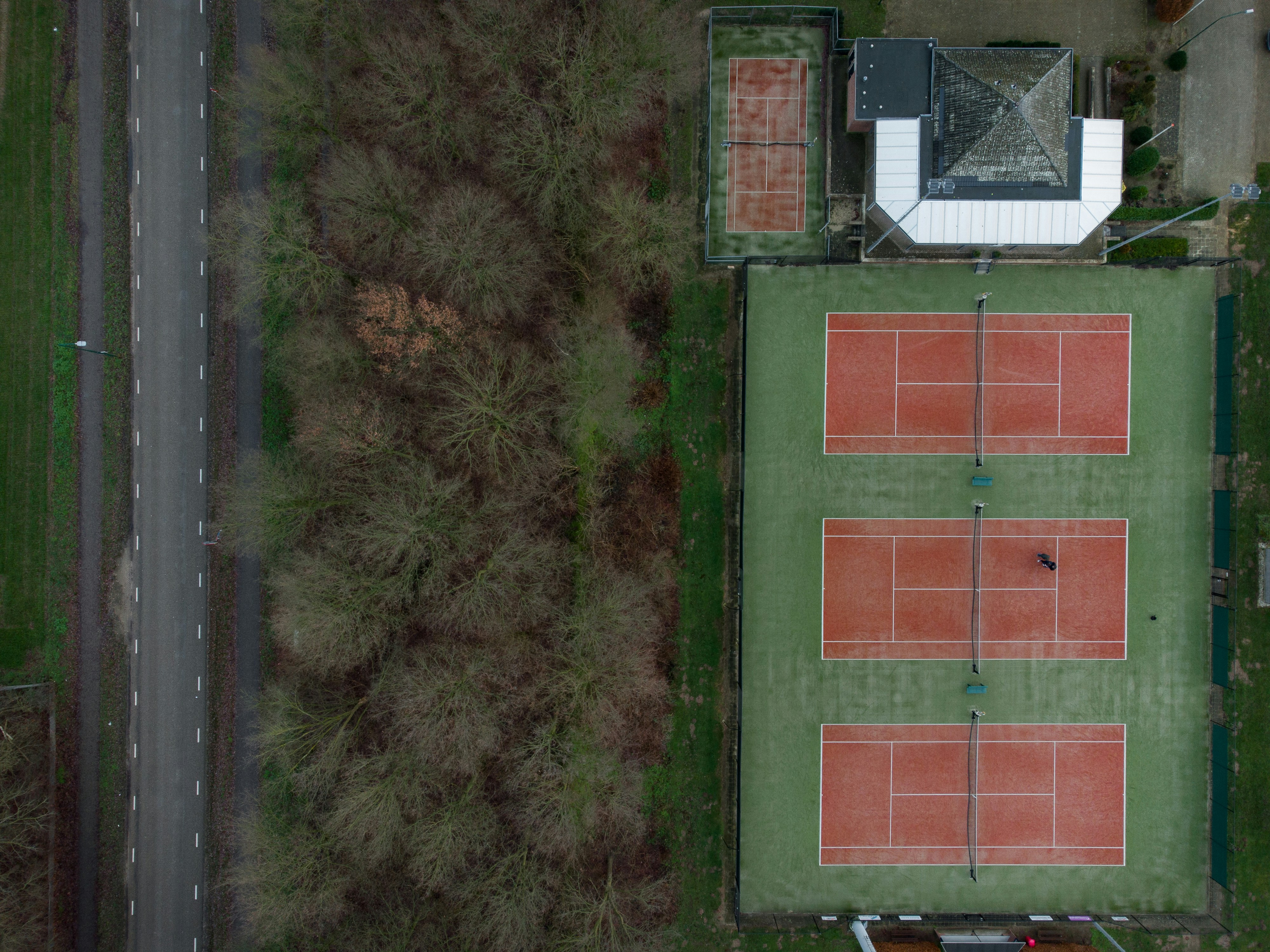 Aerial view of green and red soccer field photo – Free Escharen Image ...